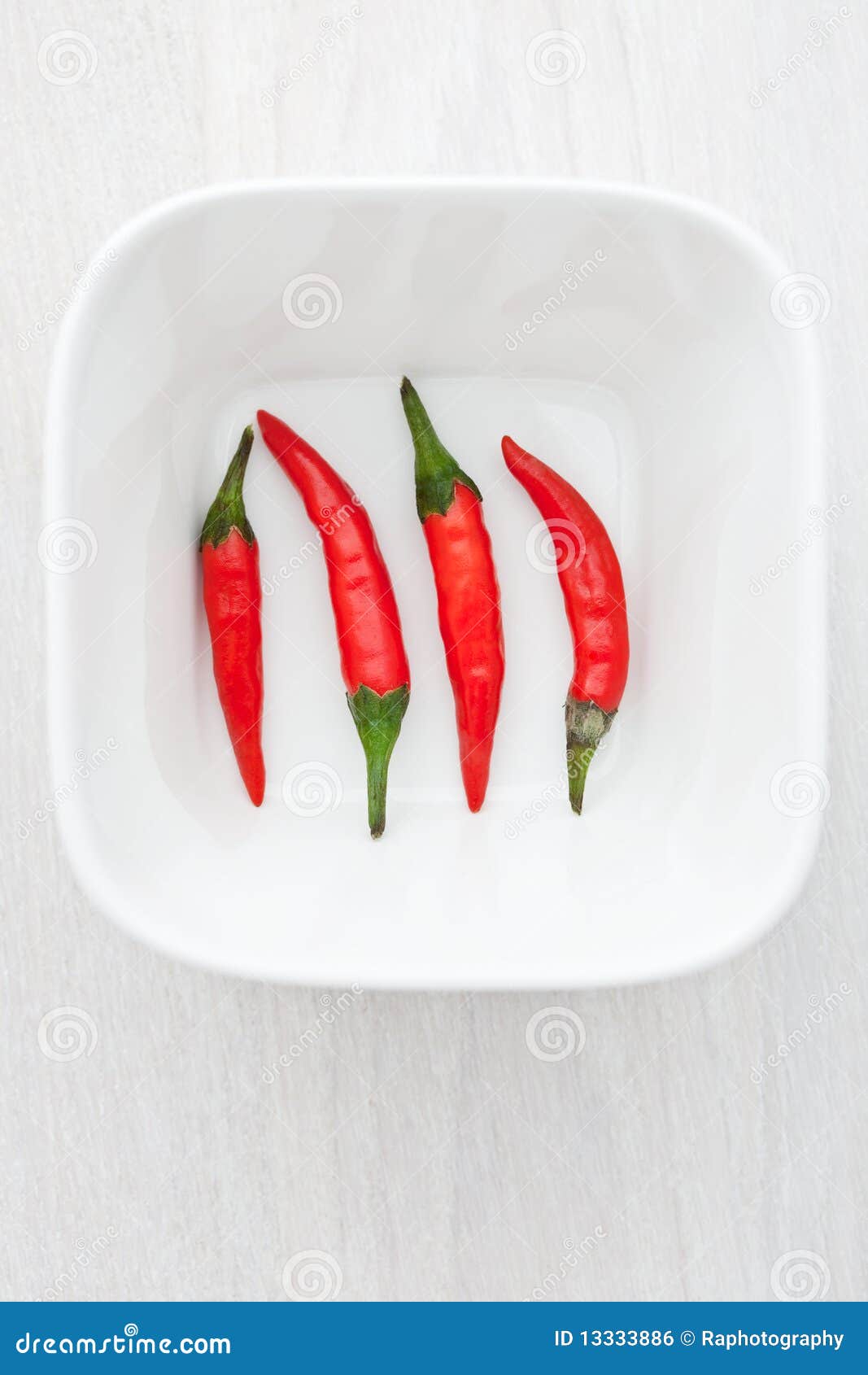 Four hot chili peppers stock photo. Image of dish, ingredient - 13333886