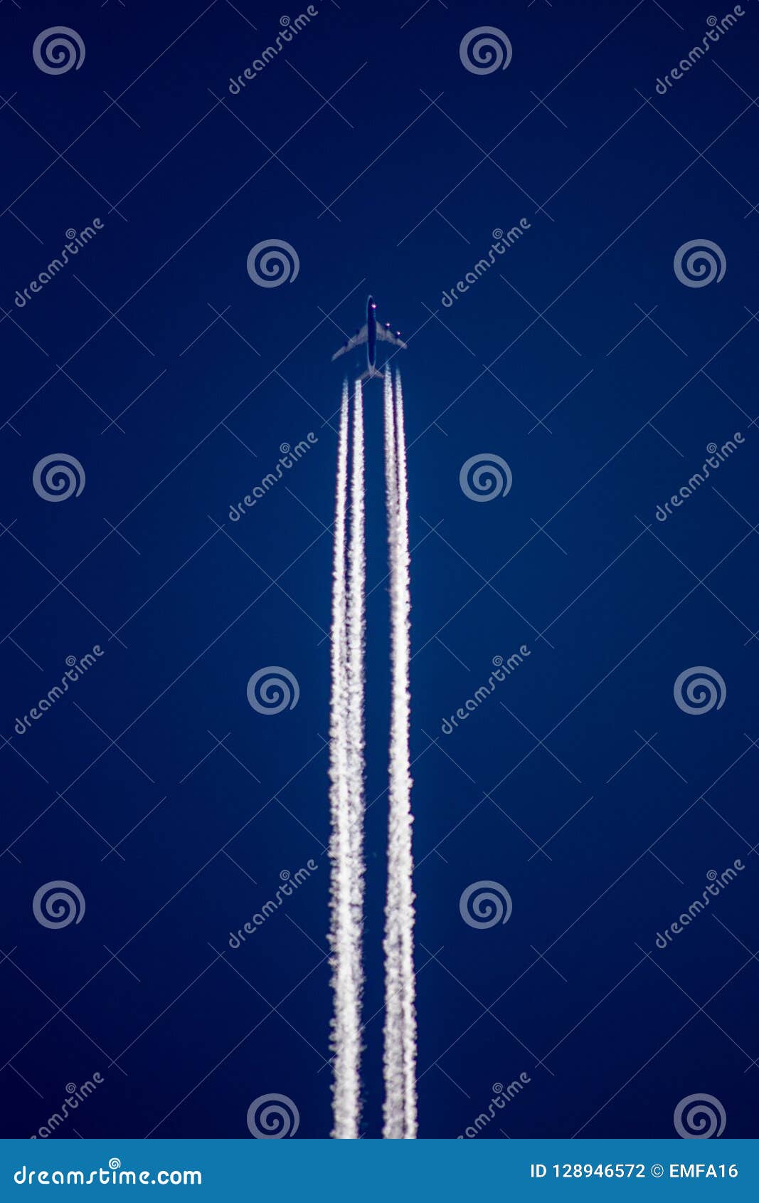 Four Jet Trails on a Navy Blue Sky Stock Photo - Image of vapor, white ...