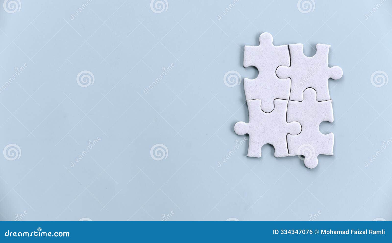 Four Jigsaw Puzzle Pieces Interlocking: Symbolizing Teamwork and ...