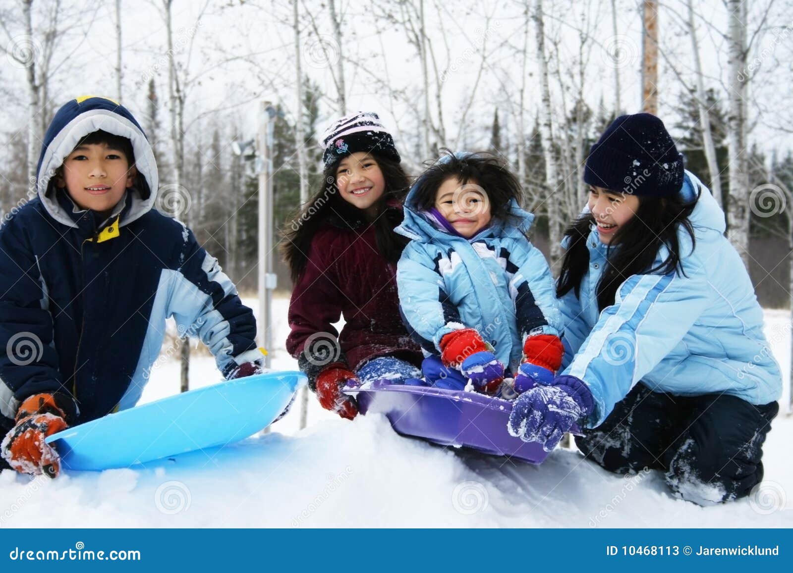 Four kids enjoying winter stock image. Image of outdoor - 10468113
