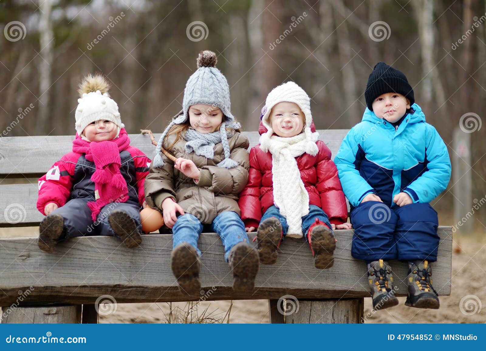 Four Kids Having Fun on Early Spring Stock Photo - Image of jacket ...