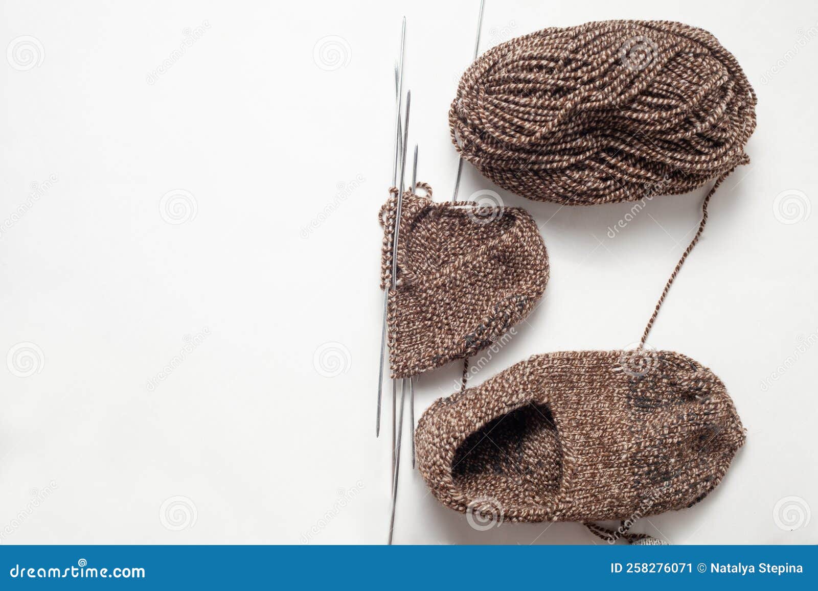 On Four Knitting Needles the Beginning of Knitting the Sock. Hand ...