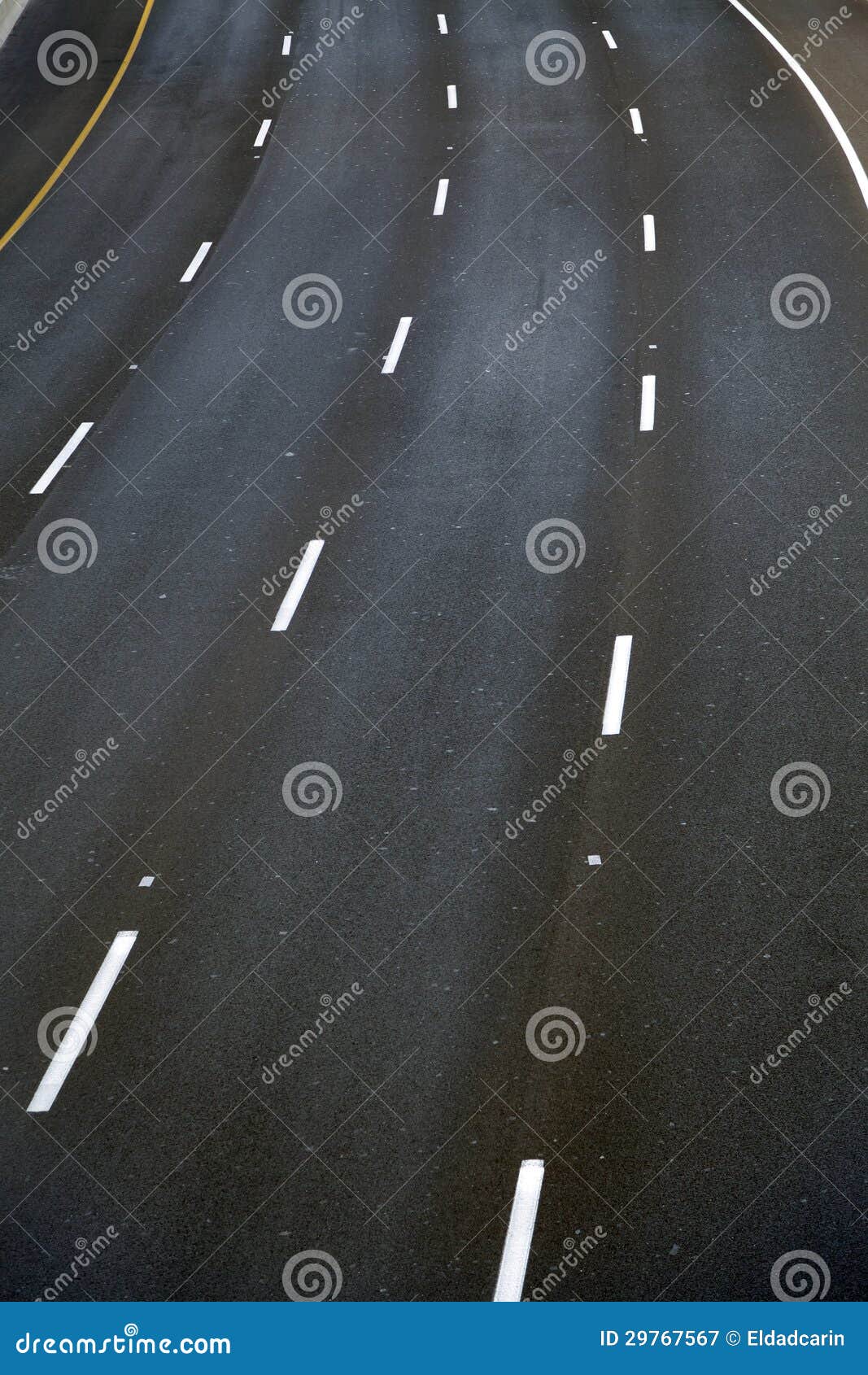 Four Lane Road With A Pedestrian Crossing Warning Sign In The Traffic ...