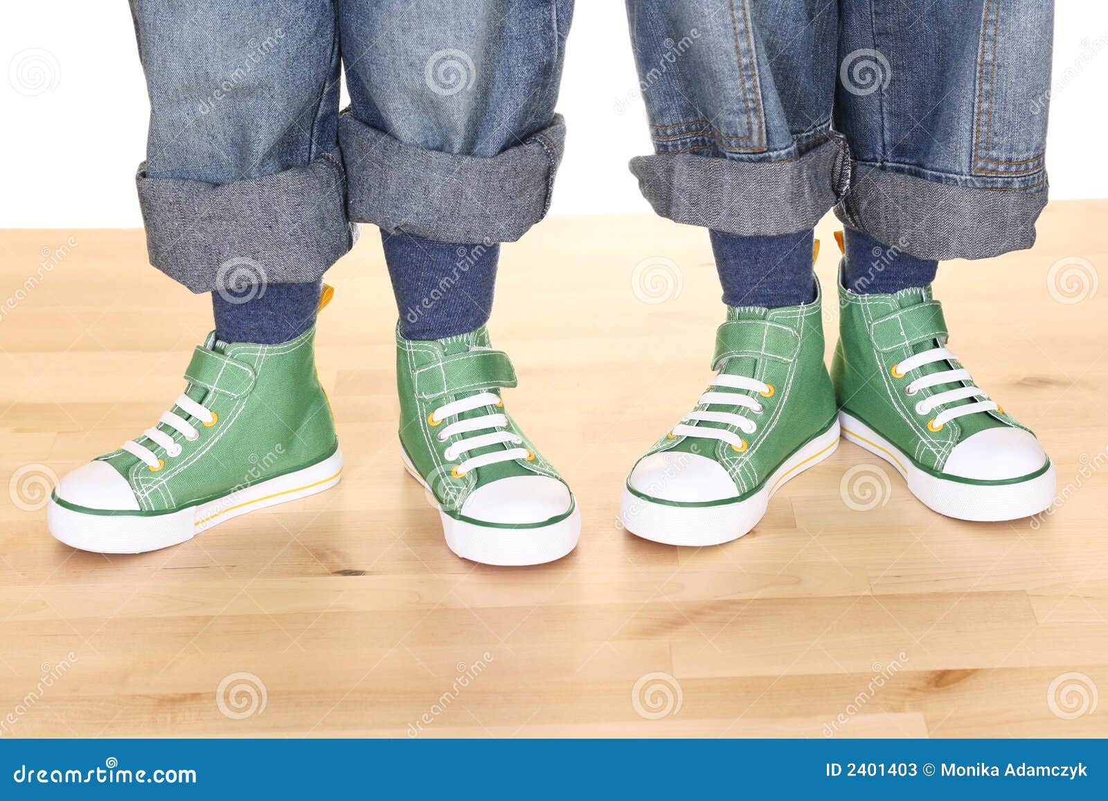 Four legs stock image. Image of pair, jeans, floor, foot - 2401403