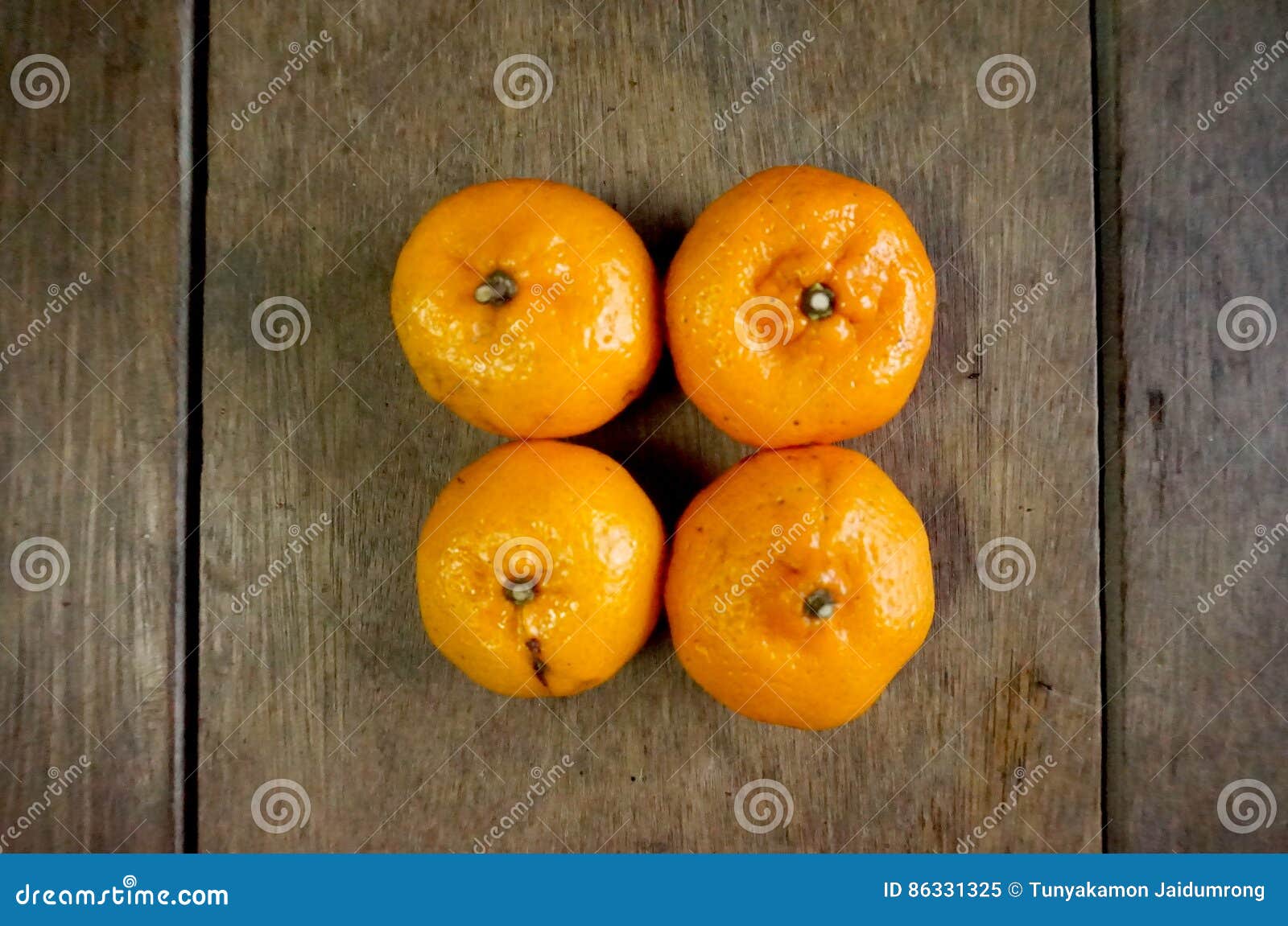 Four mandarin oranges stock image. Image of vitaminc - 86331325
