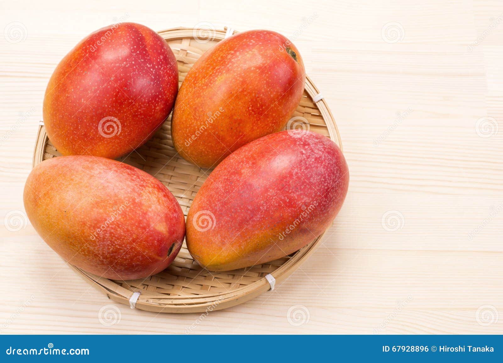 Four mango fruit stock photo. Image of ripe, bamboo, sieve - 67928896