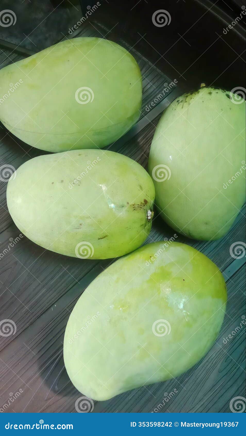 Four Mangoes Lying on the Table Stock Photo - Image of located, four ...