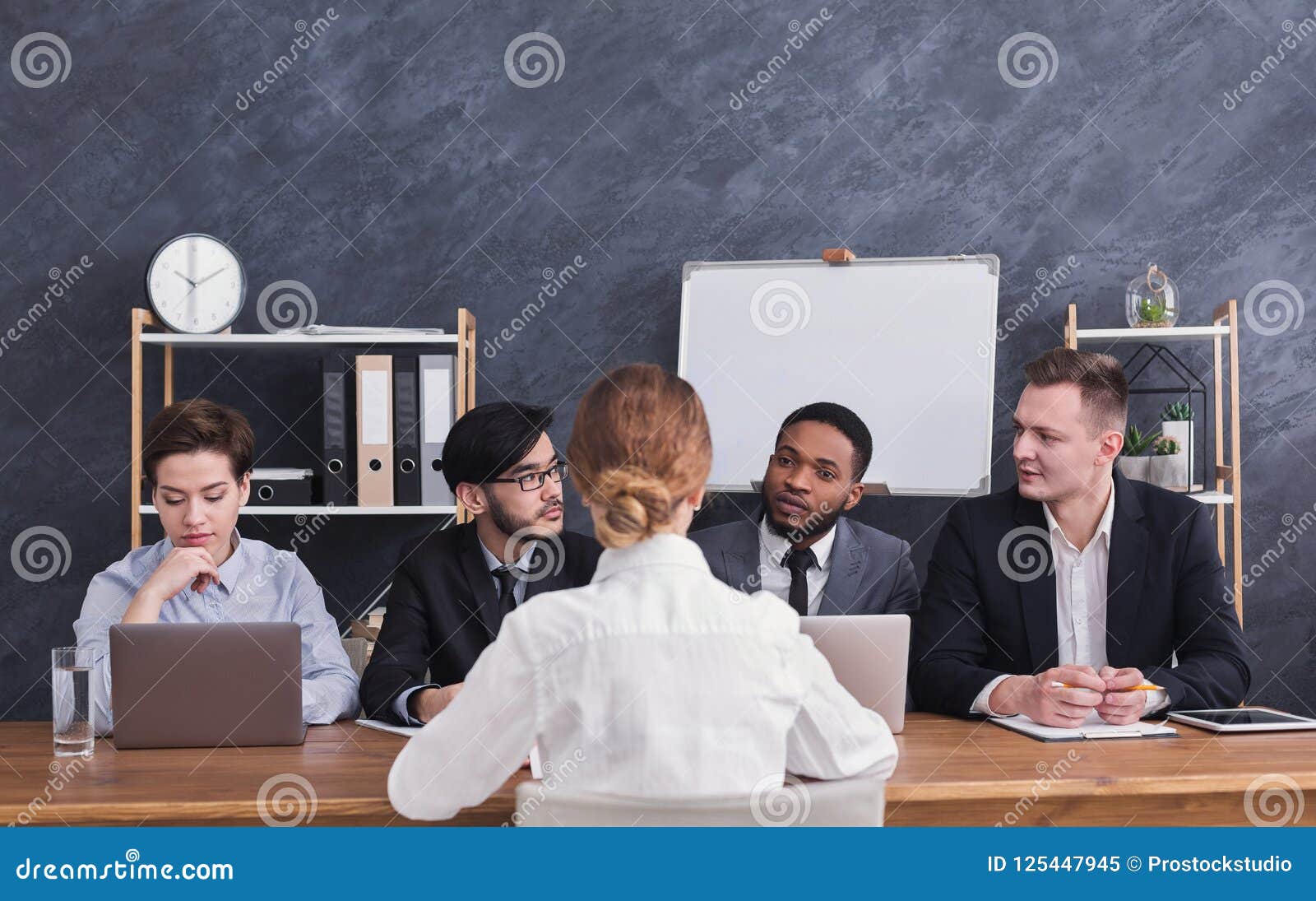 Four Members of Commission Talking with Candidate Stock Image - Image ...