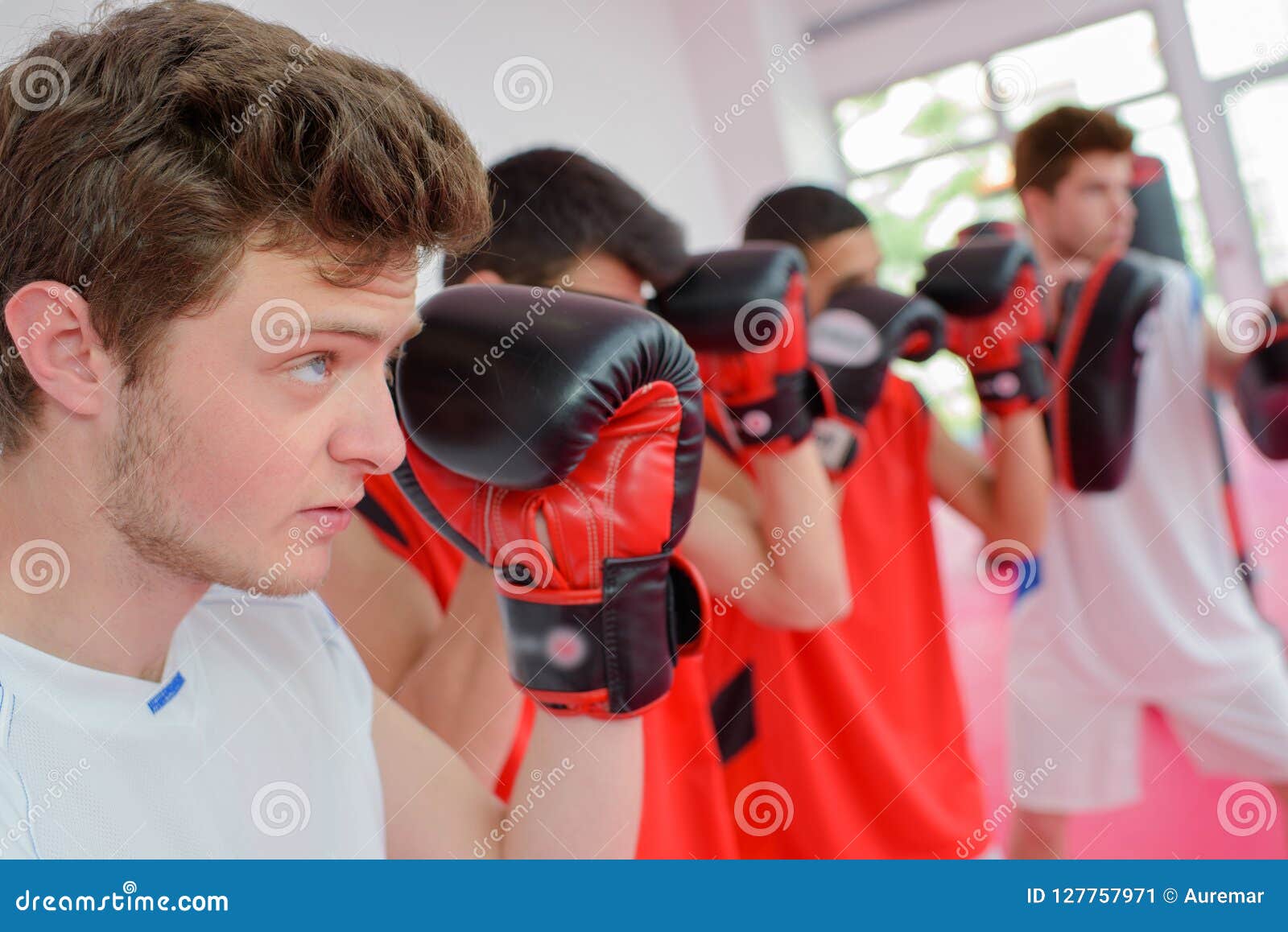 Four Men Lined Up in Boxing Class Stock Image - Image of class, boxing ...