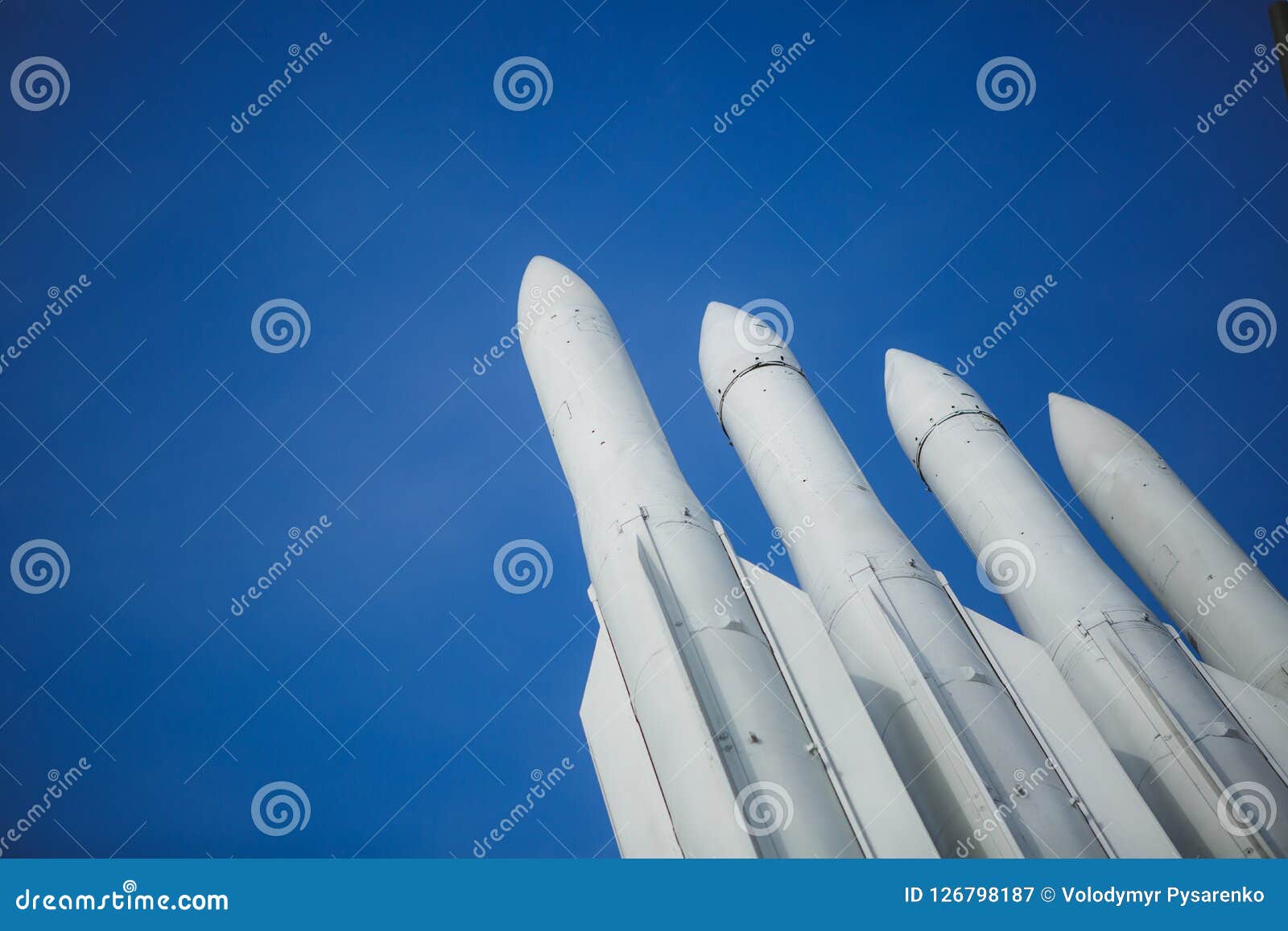 Four Missiles Against Clear Blue Sky. Weapon are Ready To War Stock ...