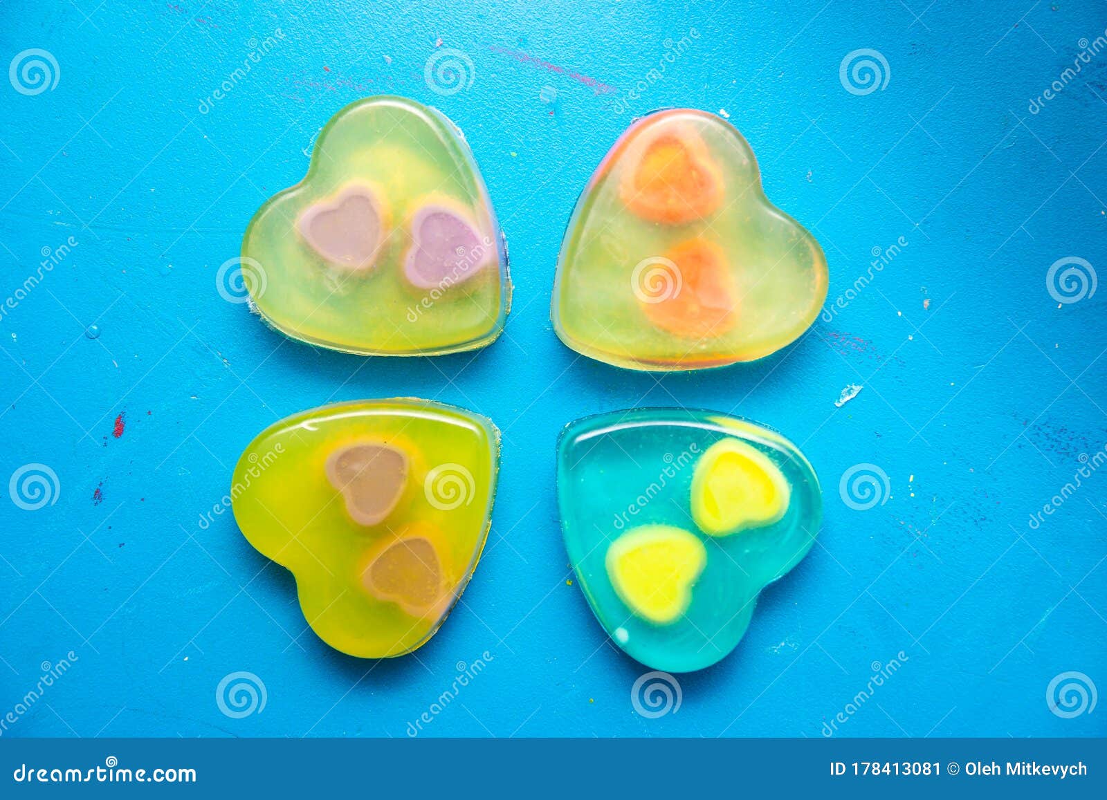 Four Multi-colored Handmade Soaps in the Form of a Heart on a Blue ...