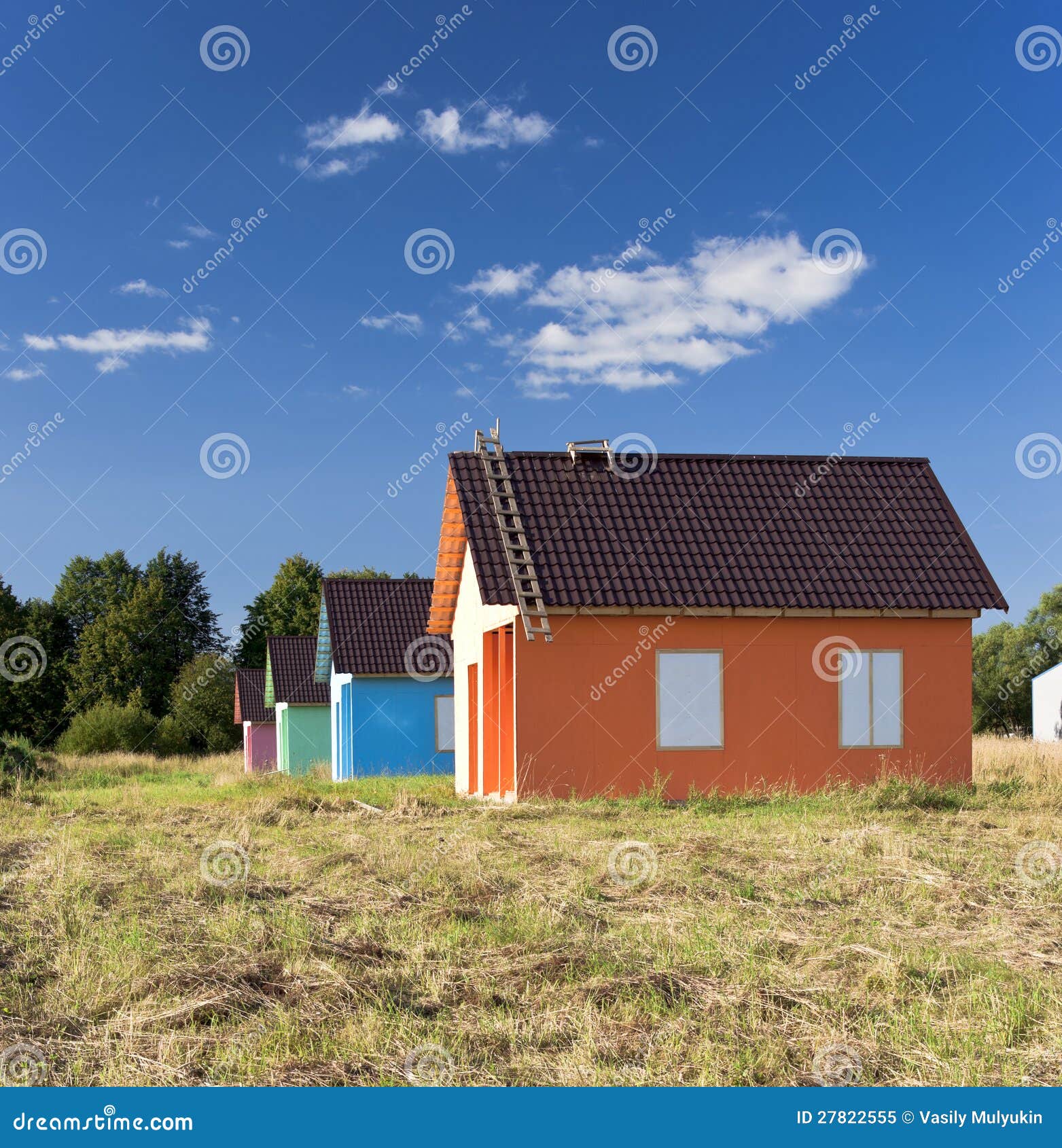 Four multicolored houses stock image. Image of identic - 27822555