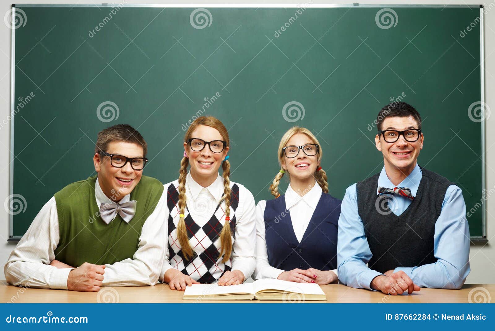 Four Nerds in Front of Blackboard Stock Photo - Image of indoors, retro ...