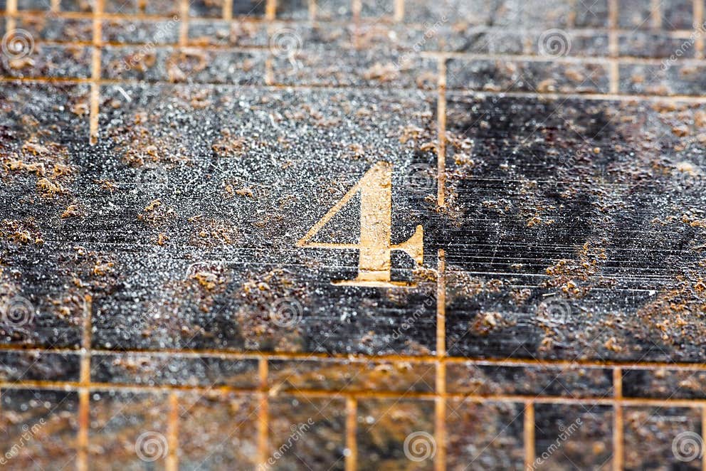 FOUR stock image. Image of digit, number, rusty, ruler - 75109781