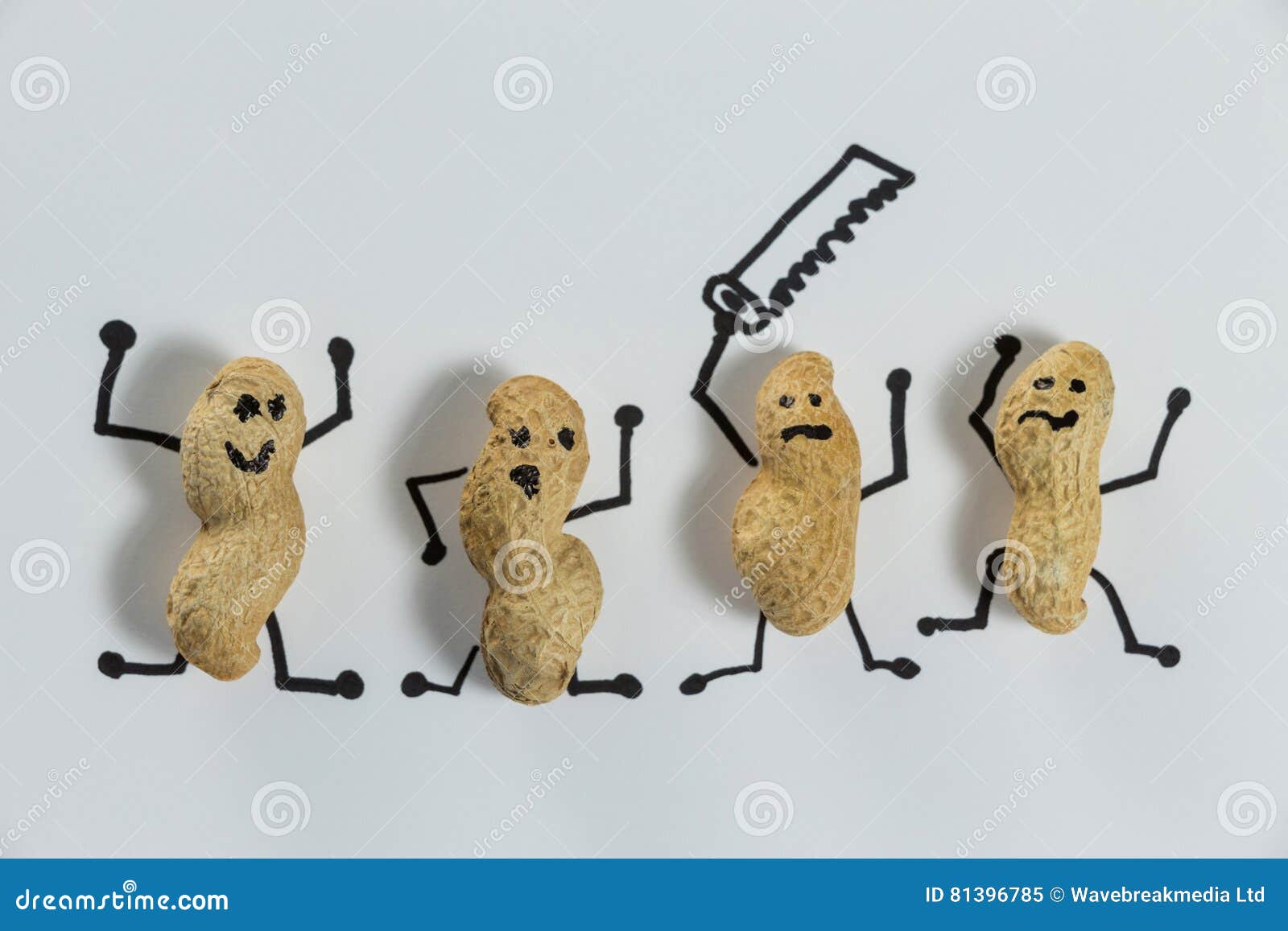Four Peanuts Figurine Having Fun with Saw Stock Image - Image of ...