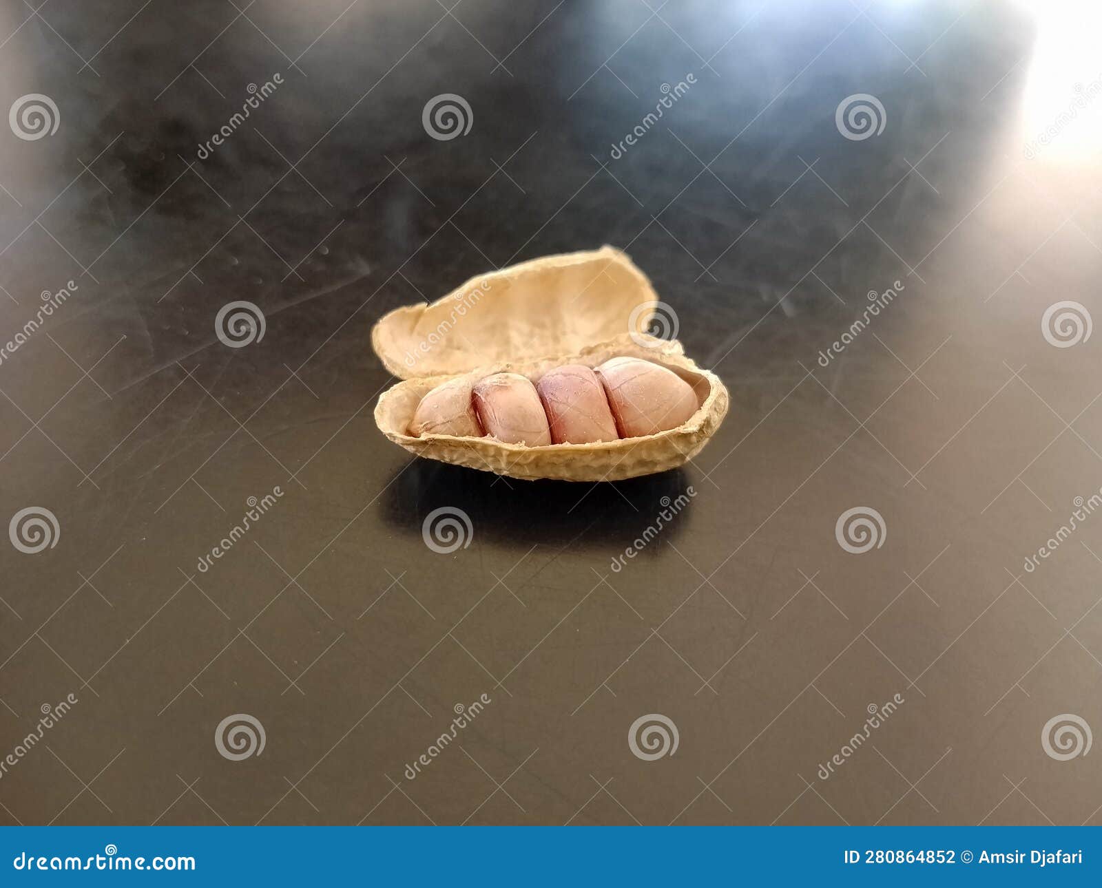 Four peanuts in one room stock photo. Image of peanuts - 280864852