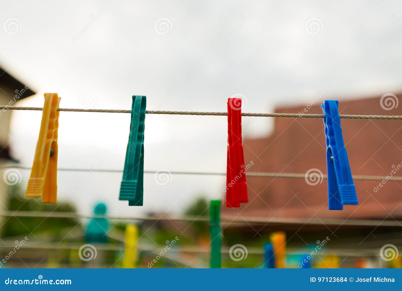 Four Pegs on a String stock photo. Image of brown, clothesline - 97123684