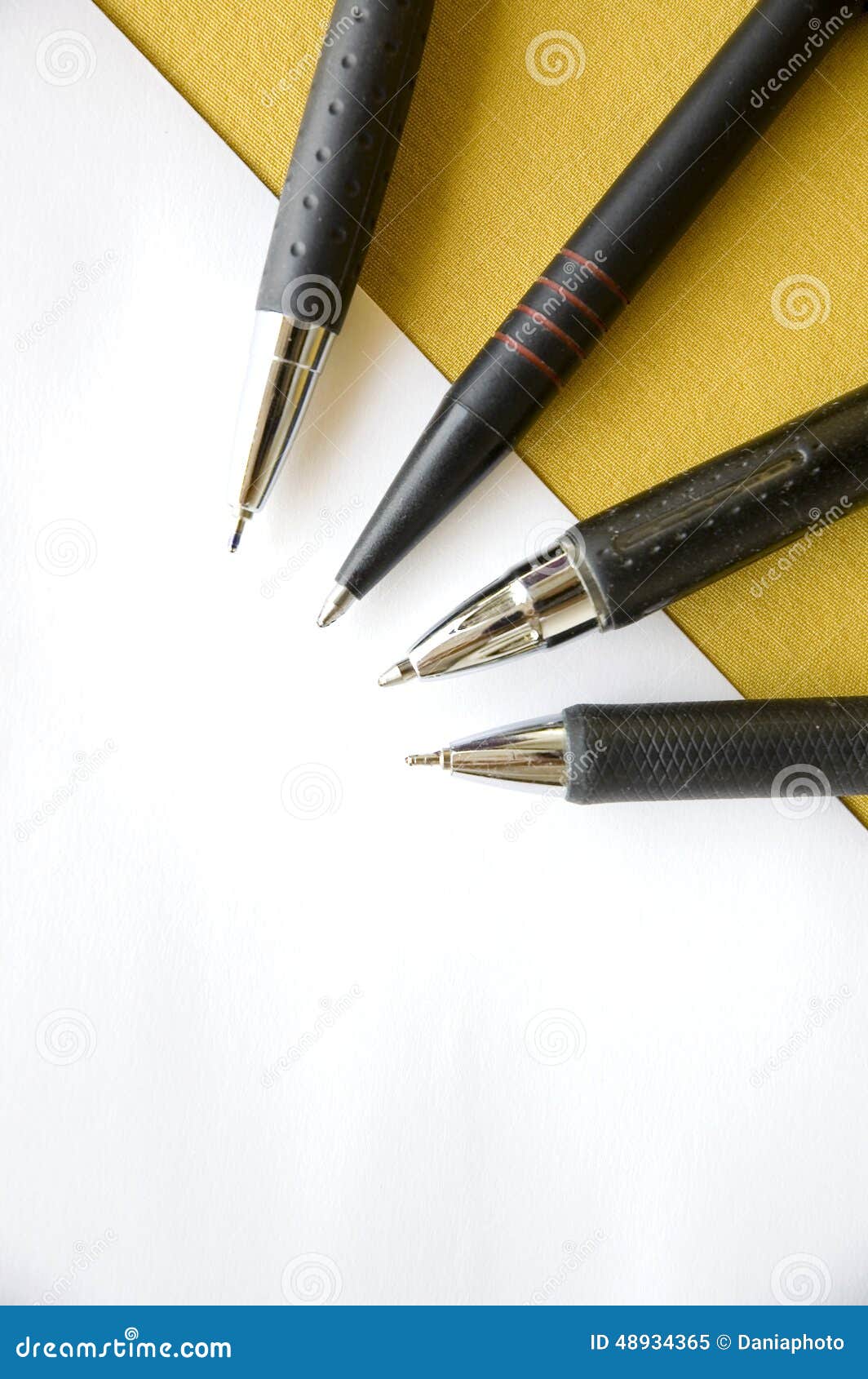 Four pen on paper stock image. Image of writing, open - 48934365