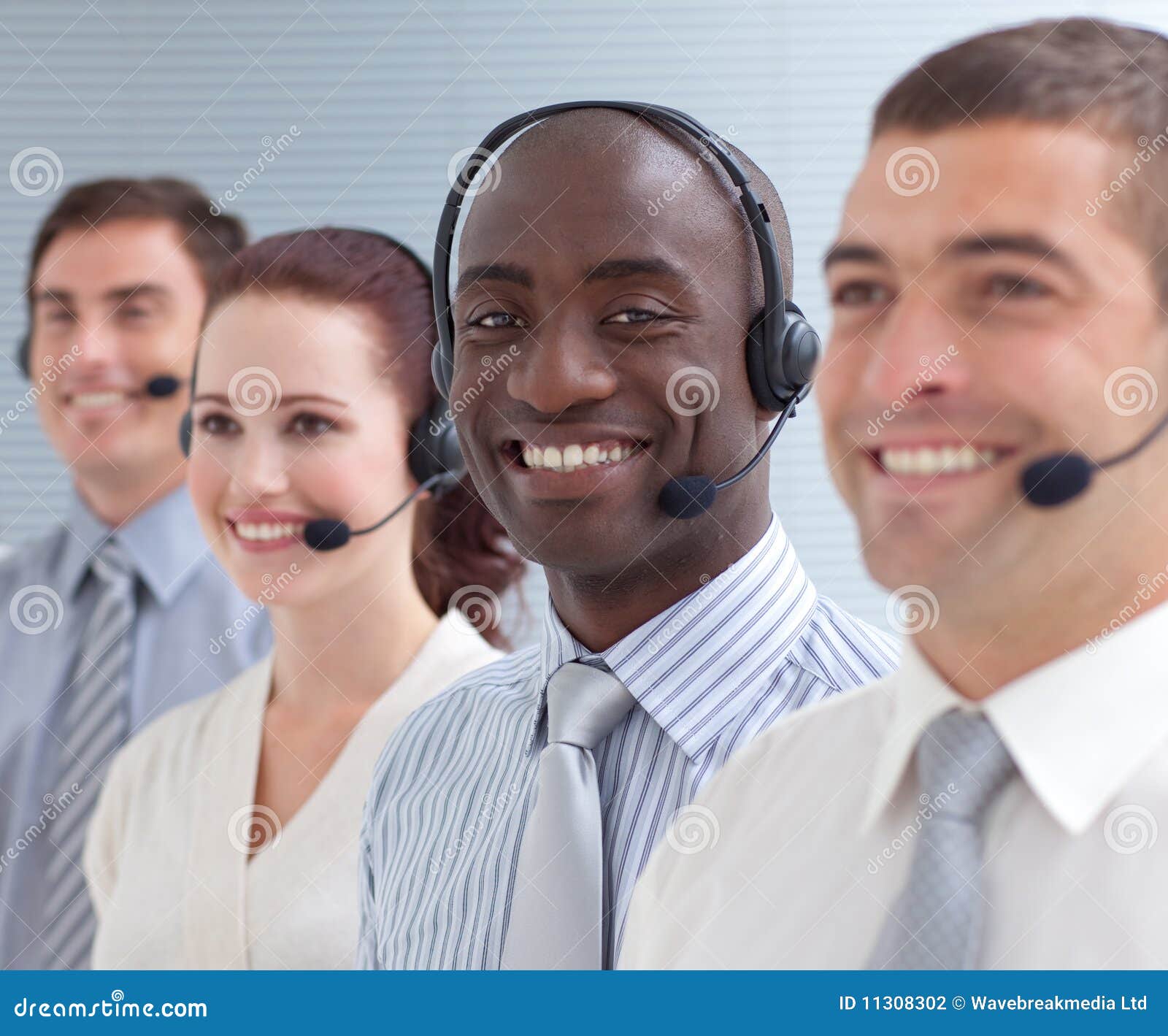 Four Peolple in a Call Center Stock Photo - Image of businesswoman ...