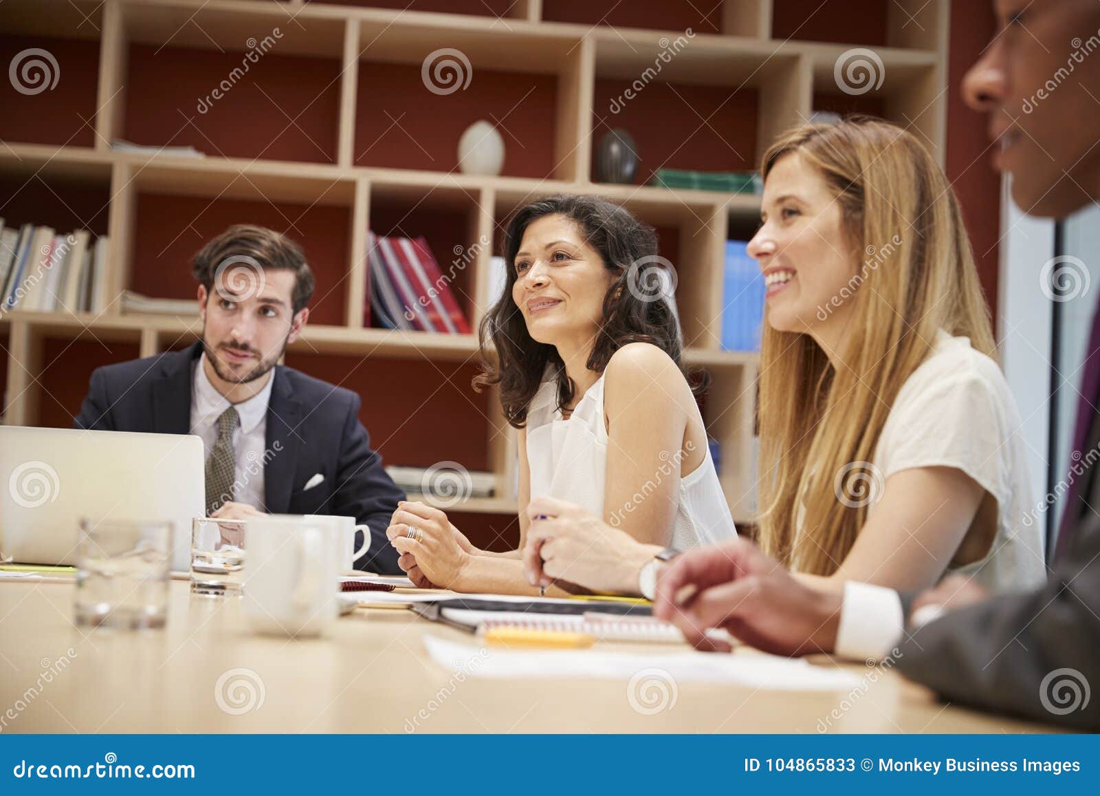 Four People at a Business Boardroom Meeting Stock Image - Image of copy ...