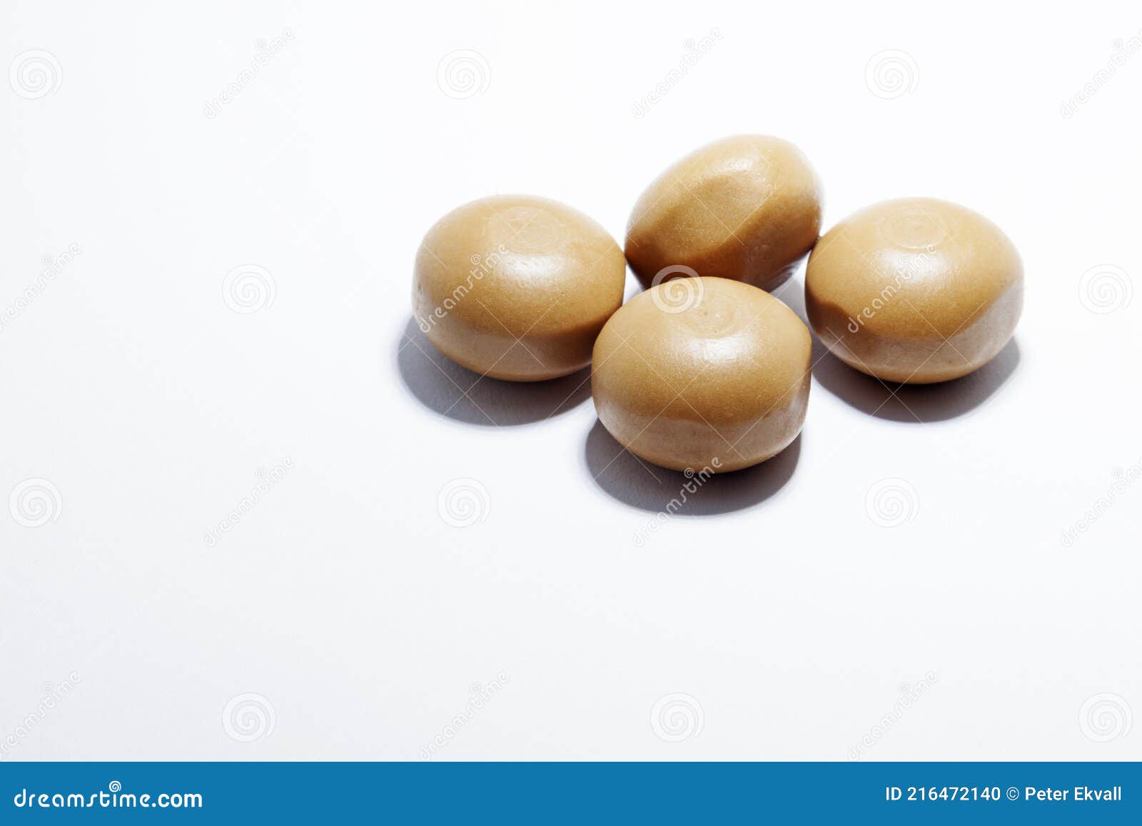 Four Pieces of Chocolate Caramel on White Background Stock Photo ...