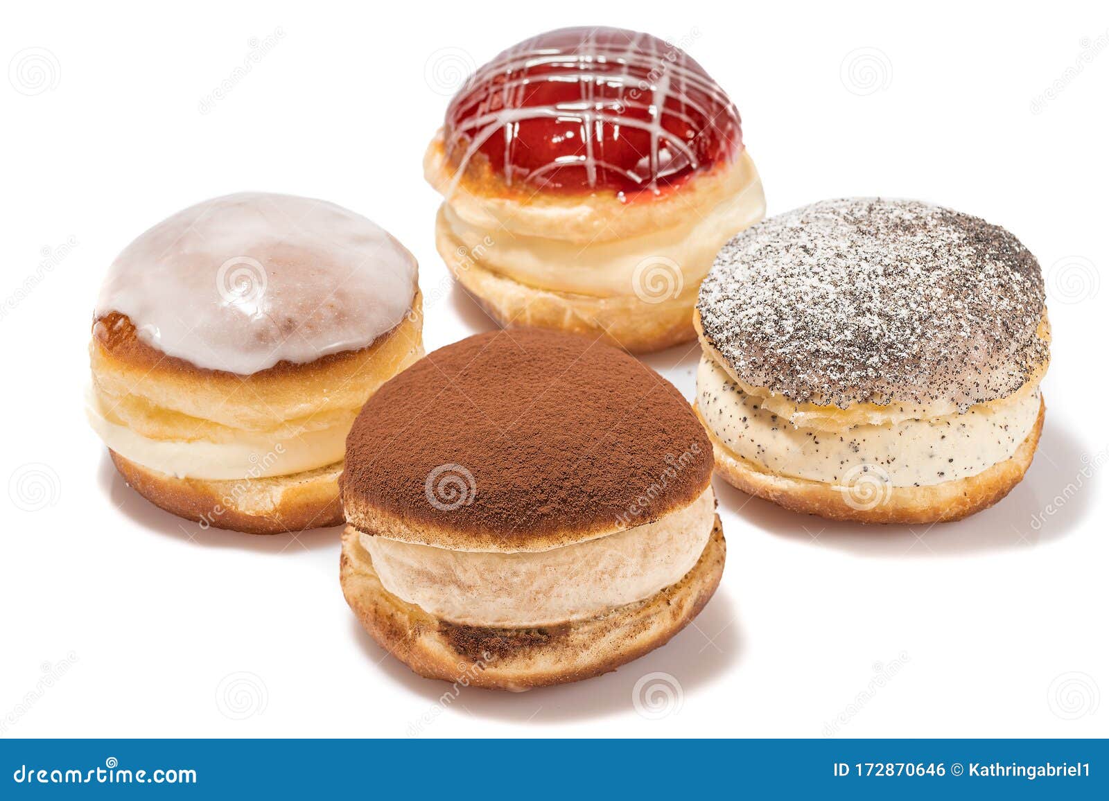 Four Pieces of Filled Doughnuts with Different Fillings Stock Photo ...
