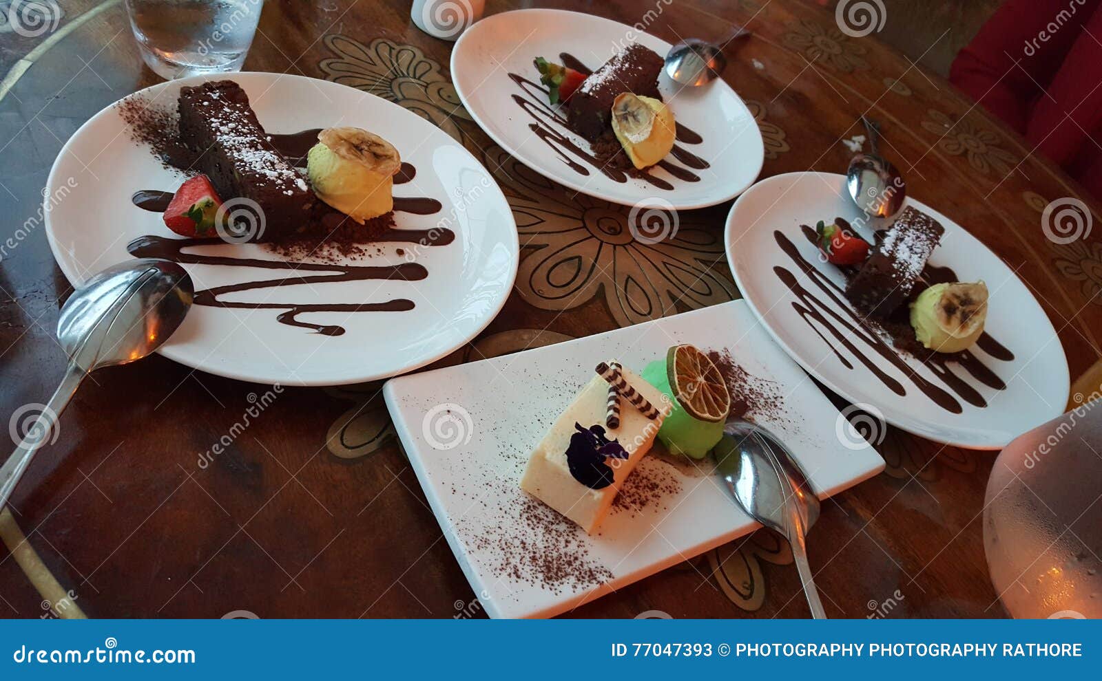 Four Plates = Four Deserts. Stock Image - Image of luxurious, midnight ...