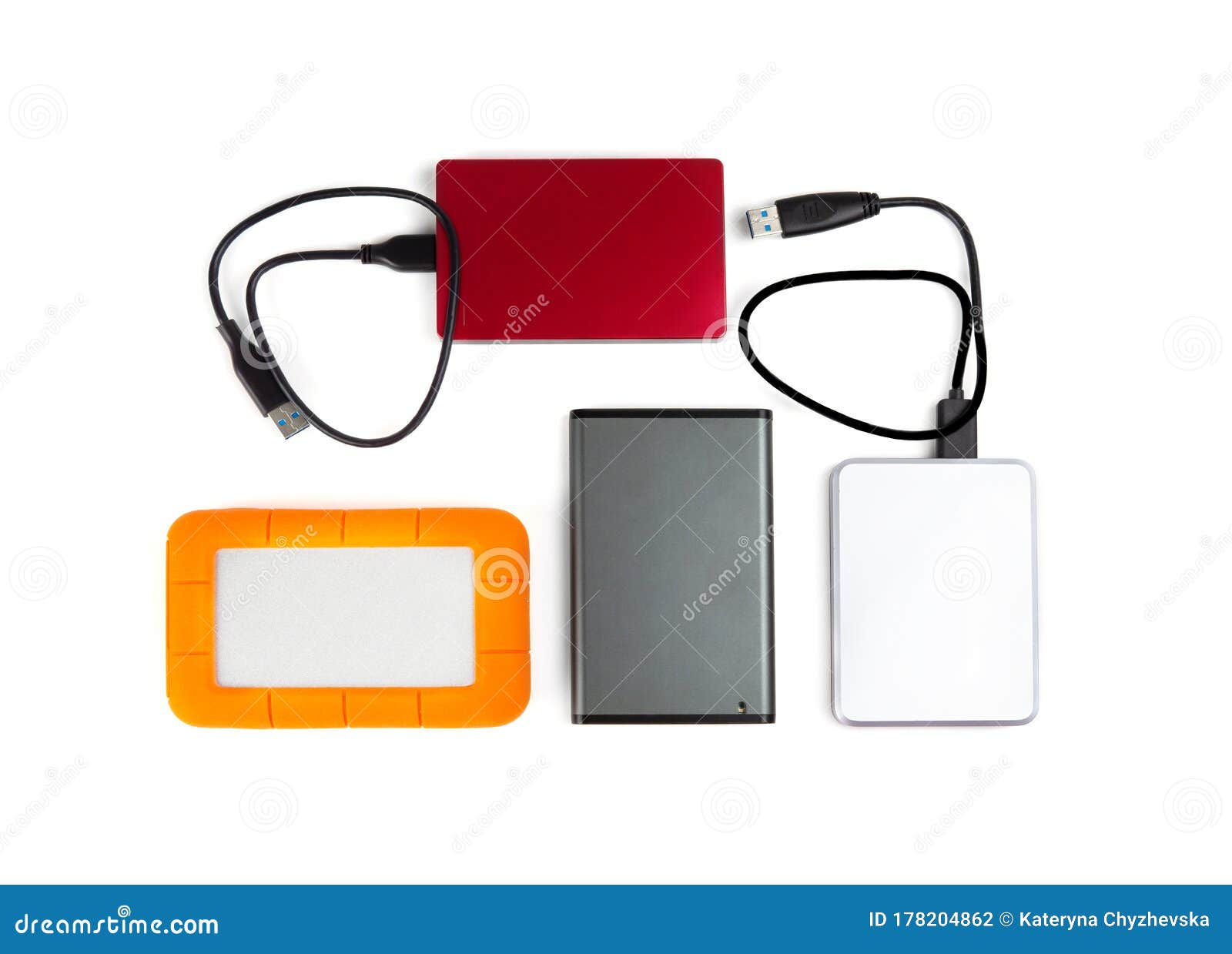 Four Portable Hard Disk Drives of Different Colors and Sizes Isolated ...