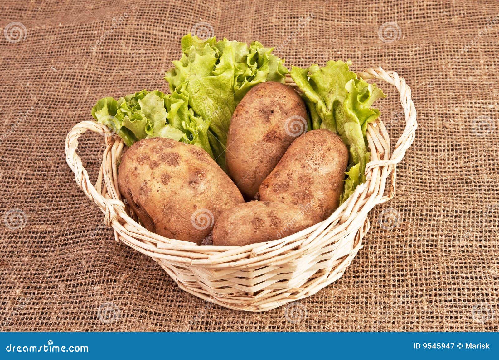 Four potatoes in basket stock image. Image of linen, healthy - 9545947