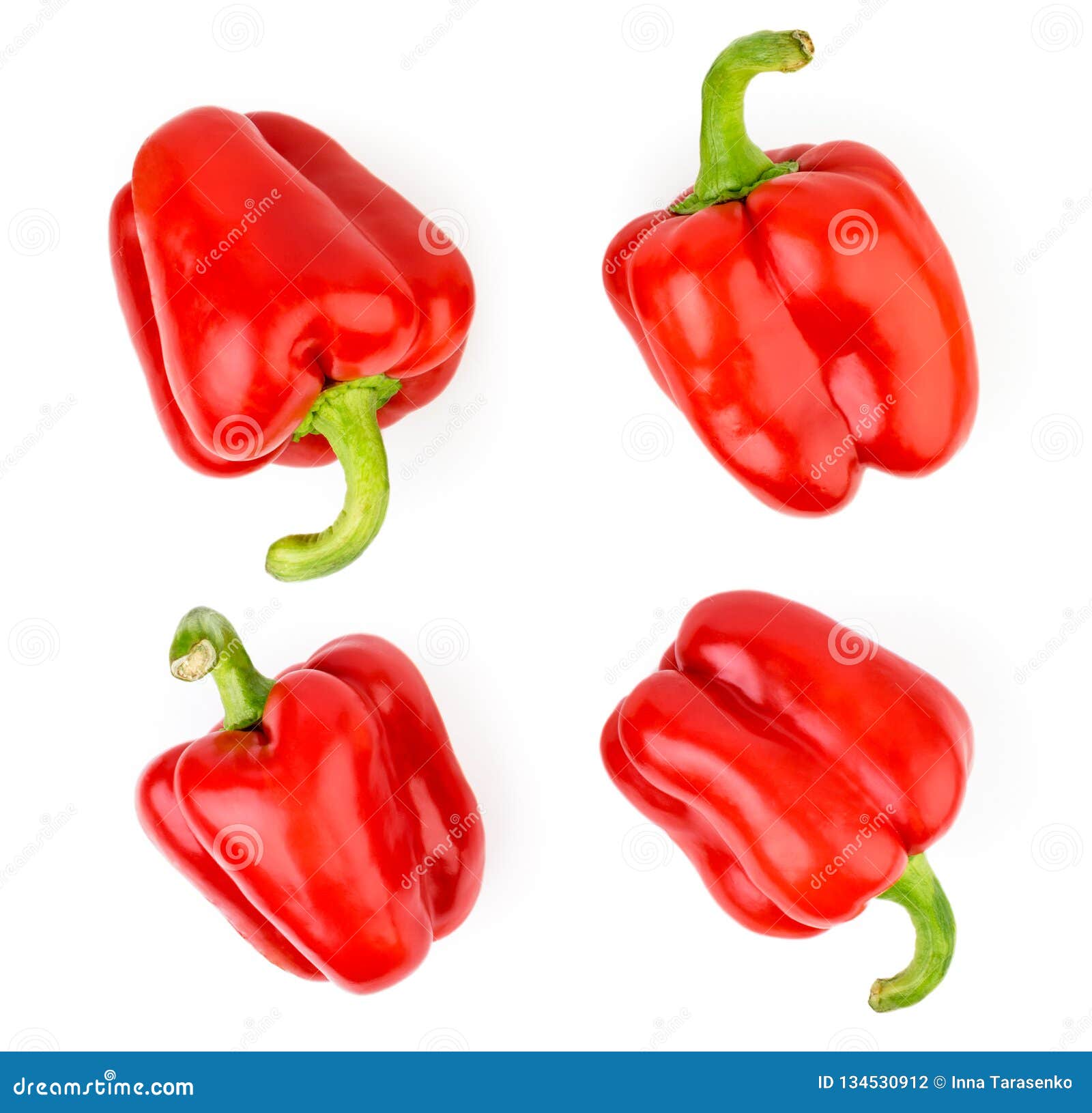 Four Red Bell Peppers on a White. the View from the Top. Stock Photo ...