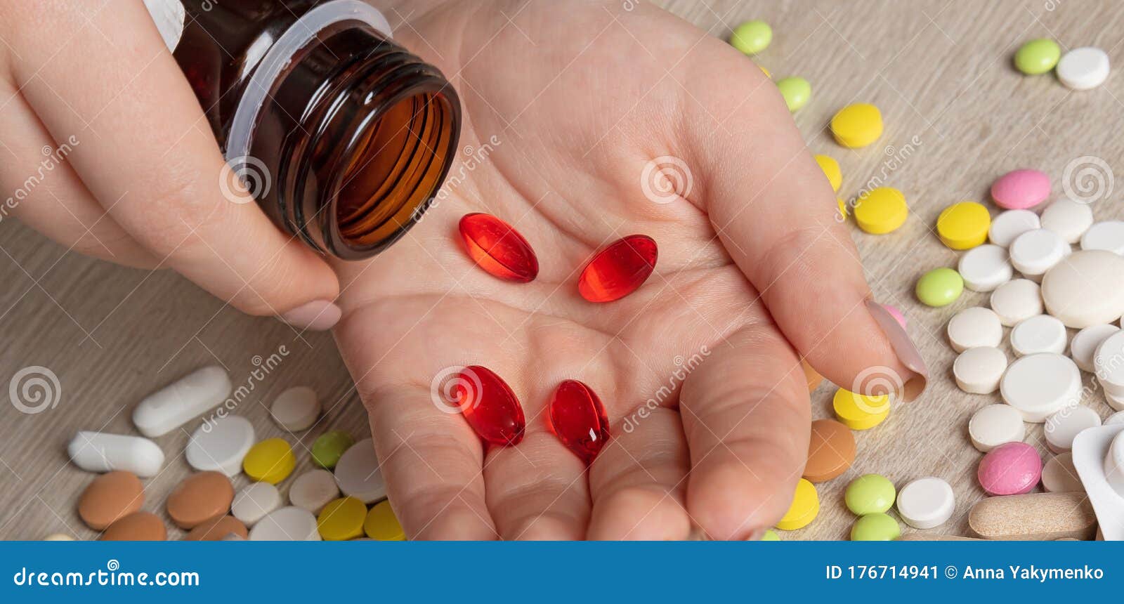Four Red Capsules in a Female Palm. Tablets in a Hand Close-up Stock ...
