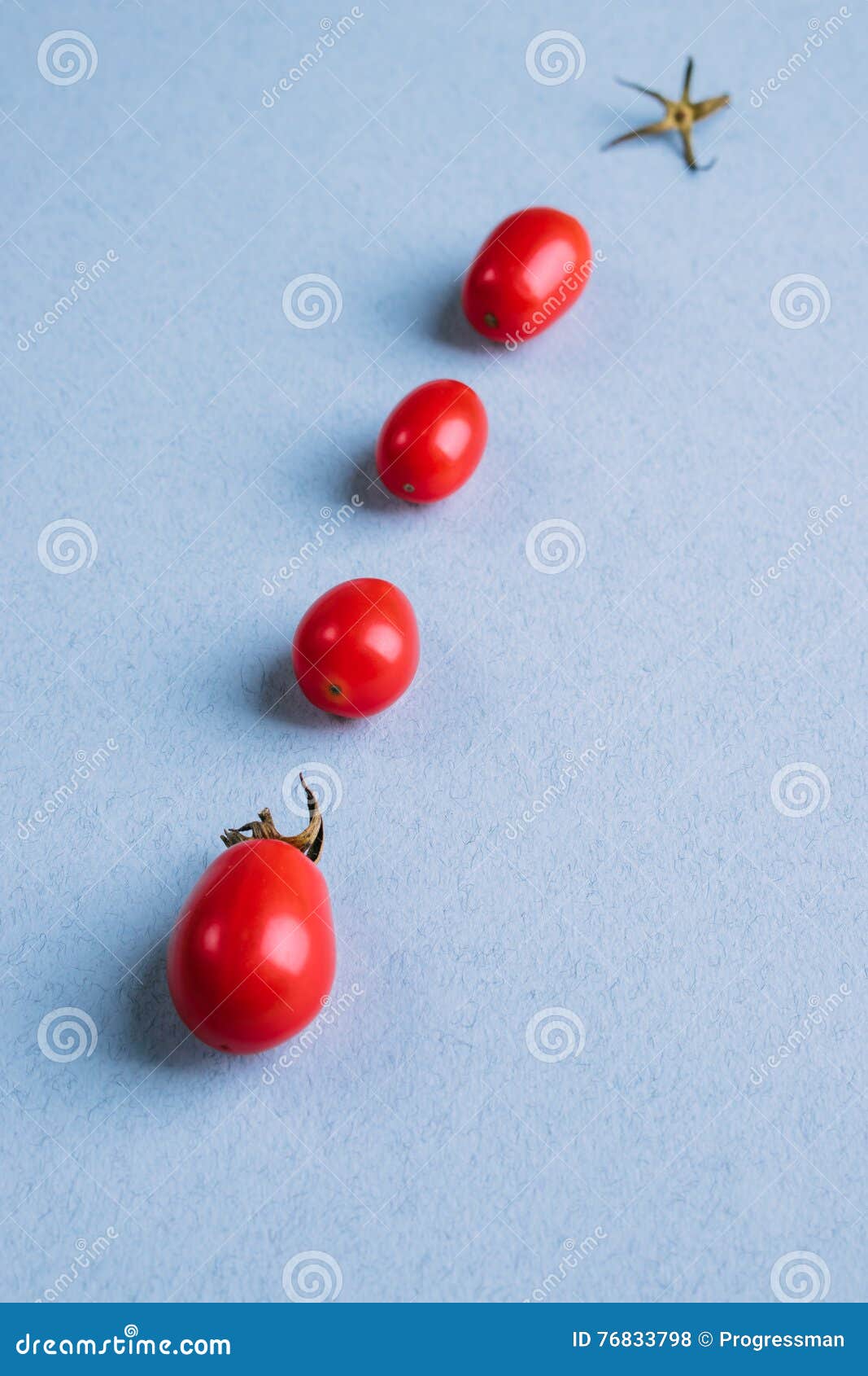 Four Red Tomatoes on a Blue Table Stock Photo - Image of organic, salad ...