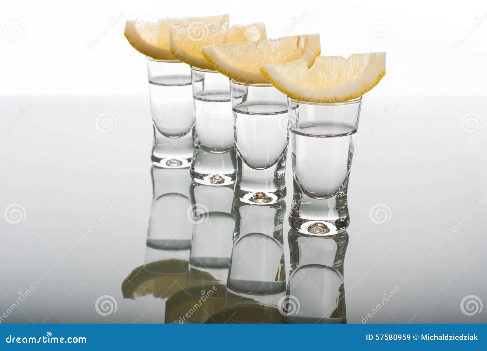 Four Shots of Vodka with Lemon Stock Image - Image of lemon, closeup ...