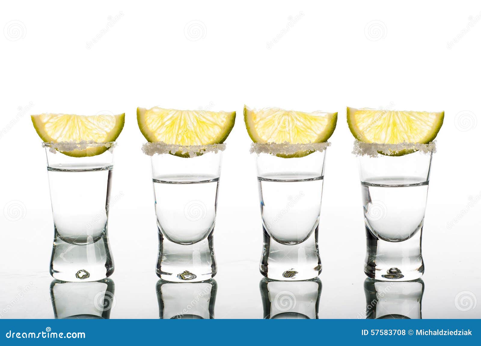Four Shots of Vodka with Lemon Stock Photo - Image of cold, alcohol ...
