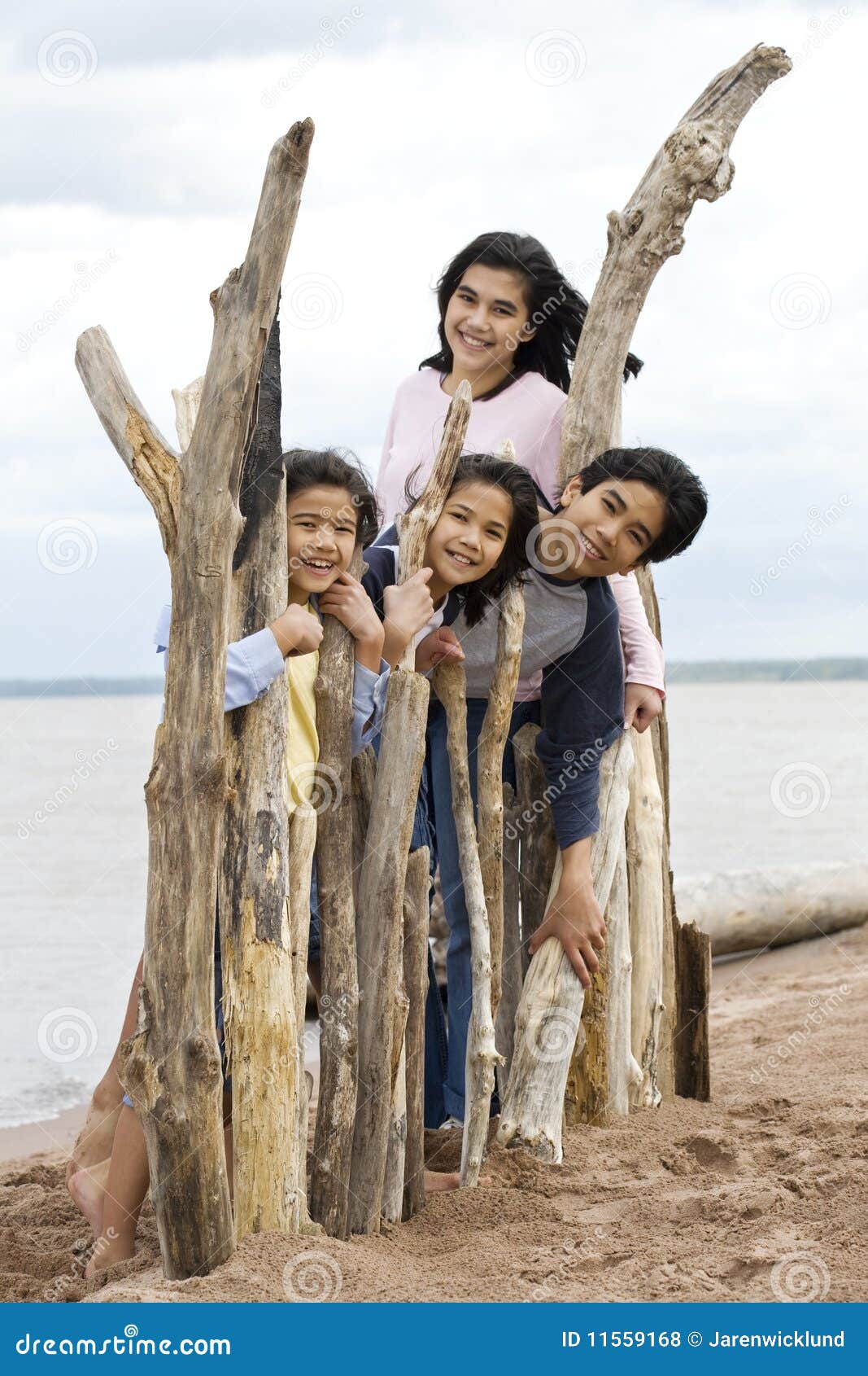 Four Siblings by the Lakeshore Stock Photo - Image of summer, mixed ...