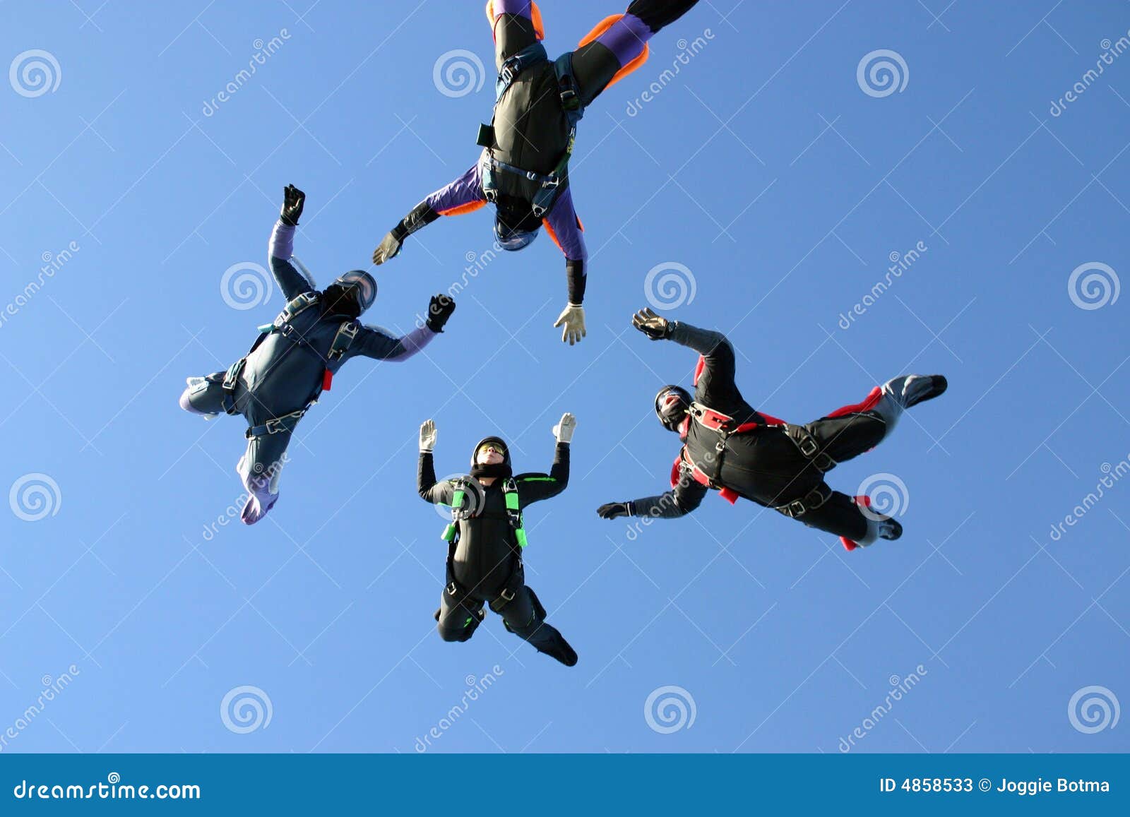Four Skydivers Building a Star Formation Stock Image - Image of turning ...