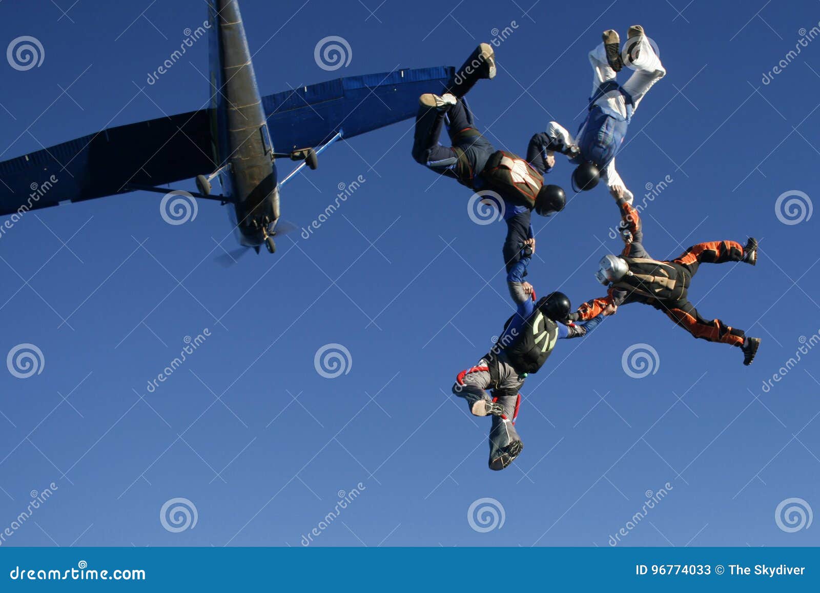 Four Skydivers Jump from the Plane Editorial Stock Photo - Image of ...