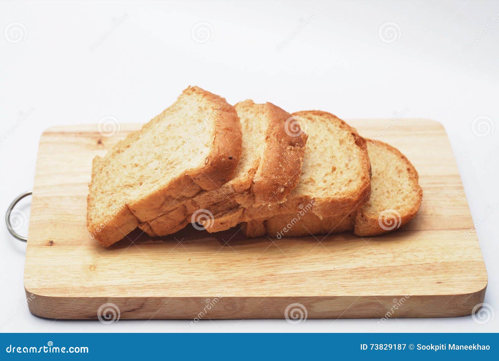 Four Slices of Bread on the Wooden Cutting Board in White Background ...