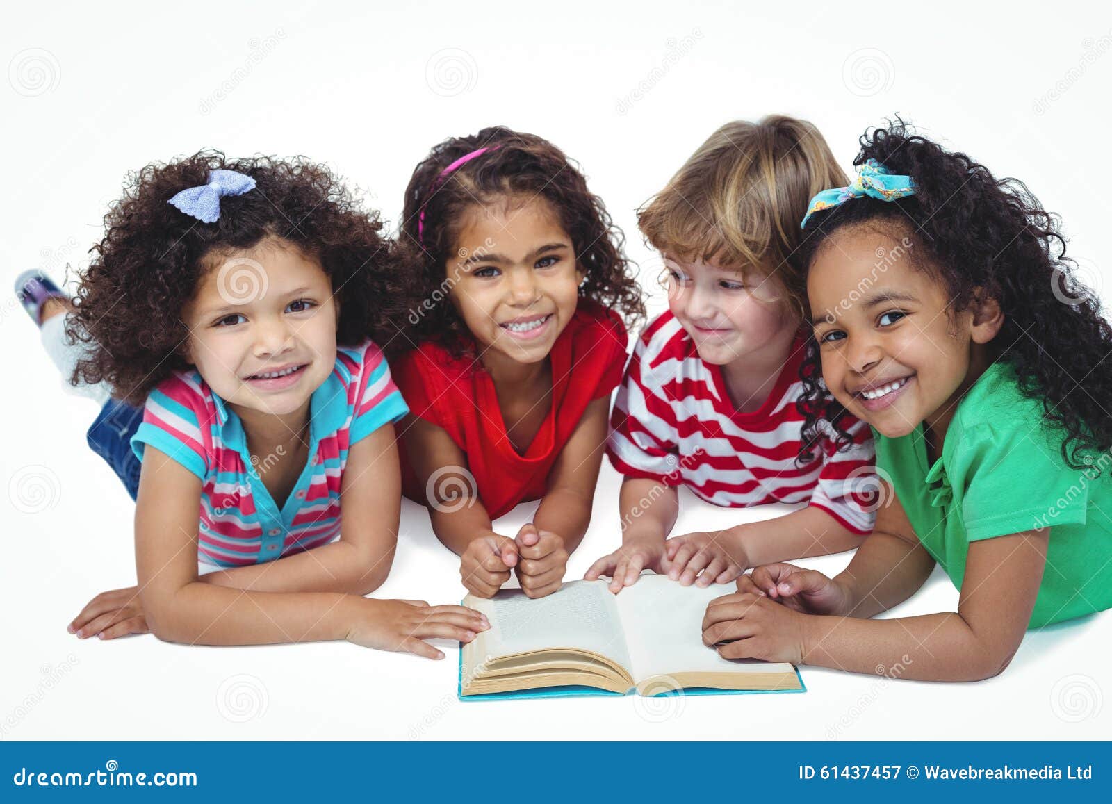 Four Small Kids Reading a Book Together Stock Image - Image of ground ...