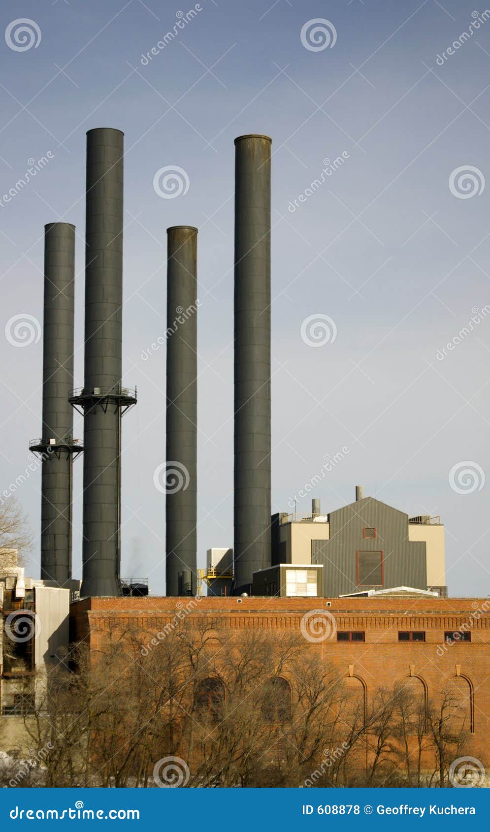 Four Smokestacks stock photo. Image of chimney, tower, environment - 608878