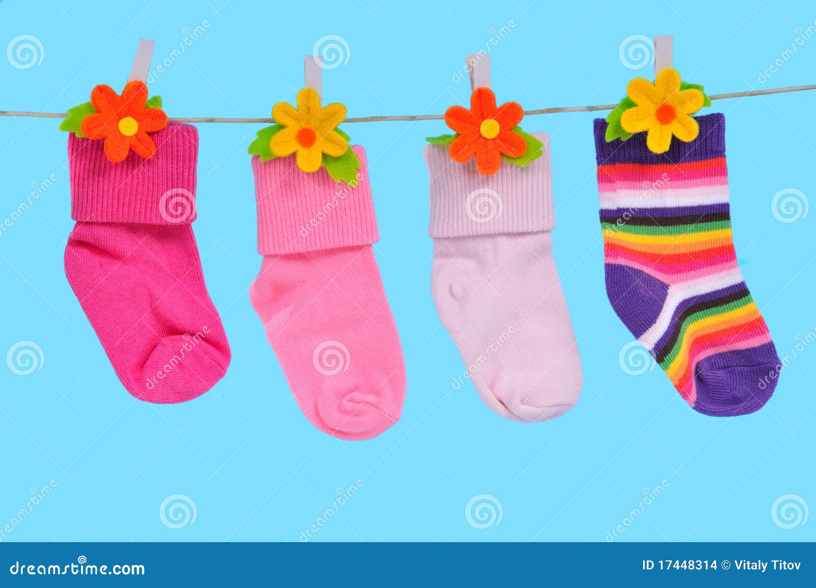 Four Socks on a String stock photo. Image of concepts - 17448314