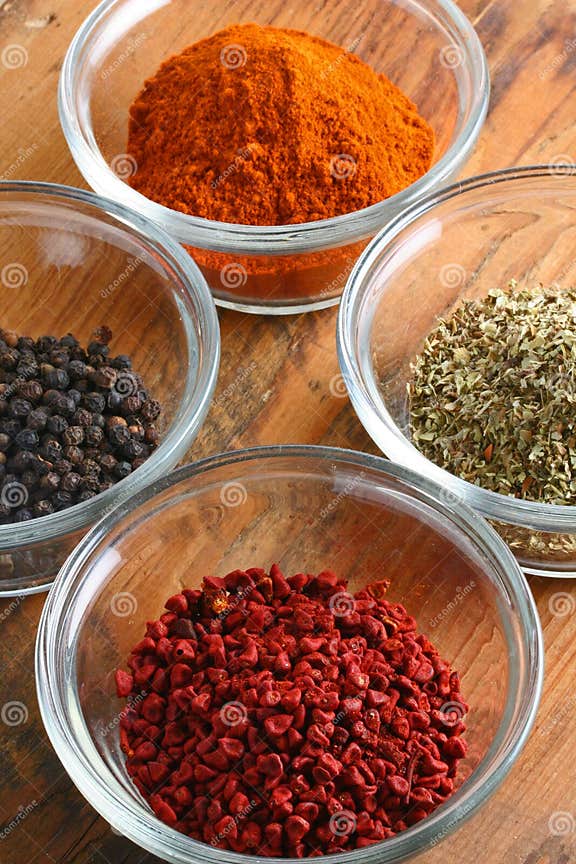 Four spices (vertical) stock photo. Image of annatto, background - 3090098