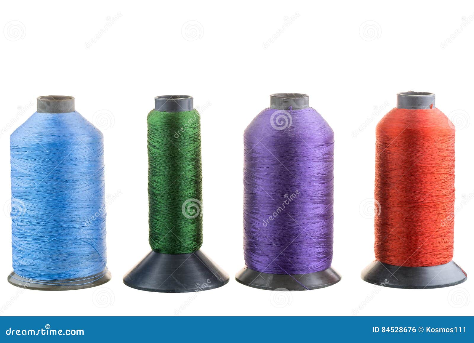 Four Spools of Silk Thread in a Row Stock Photo - Image of filament ...