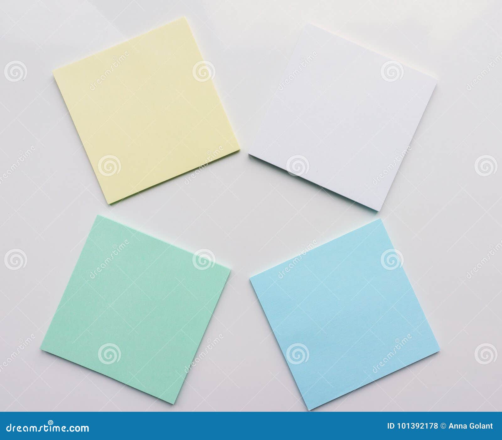 Four Square Sheet of Paper on a White Background. Top View Stock ...