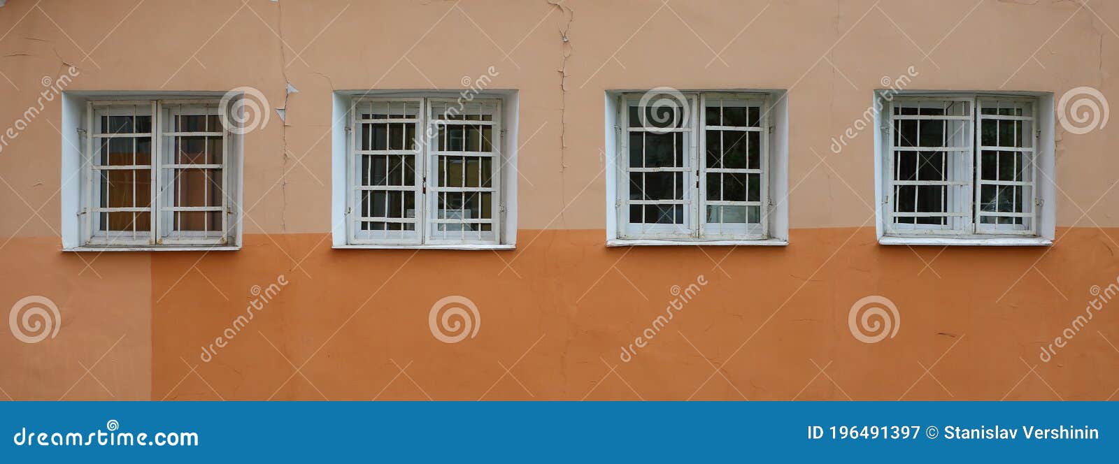Four Square Windows with a Metal Barrier Stock Image - Image of ...