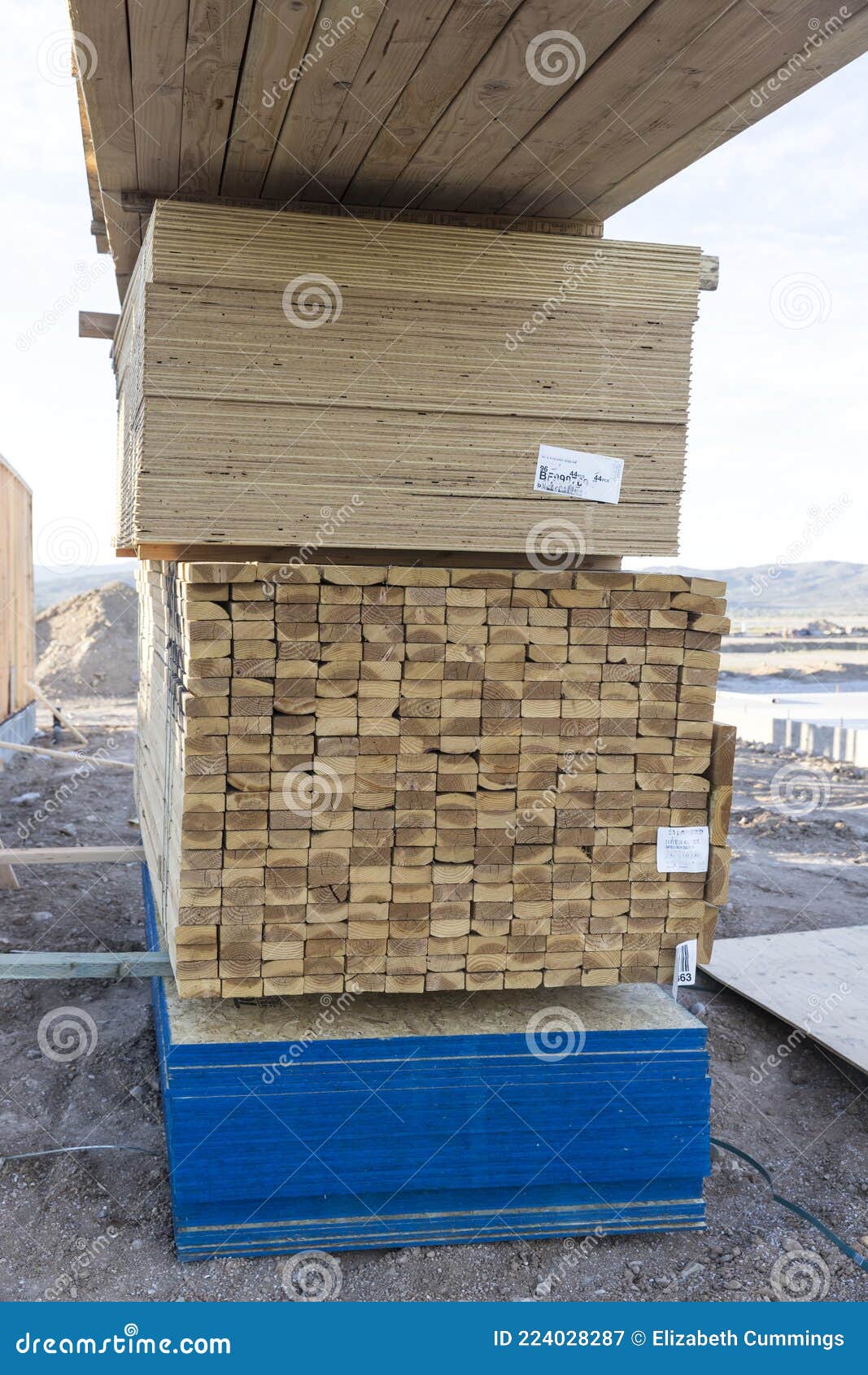 Four Stacks of Different Sized Lumber Waiting To Be Used at a ...