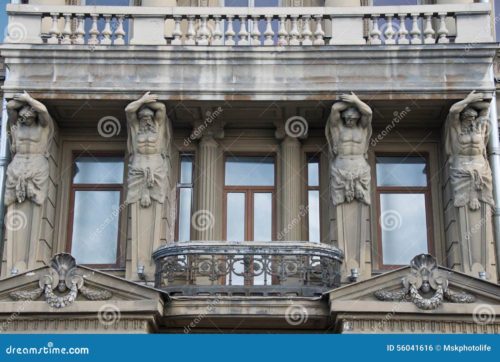 Four Statues Hold the Veranda of a Building Stock Photo - Image of ...