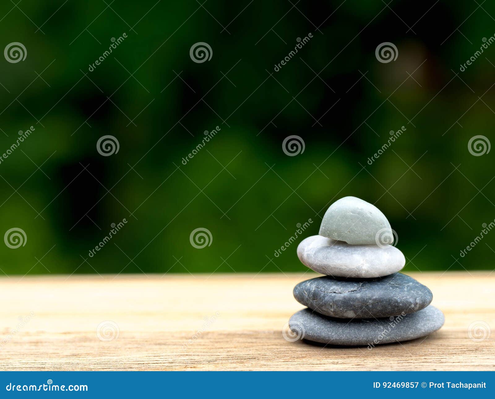 Four Stones Stacked Placed on a Wooden Board. Stock Image - Image of ...