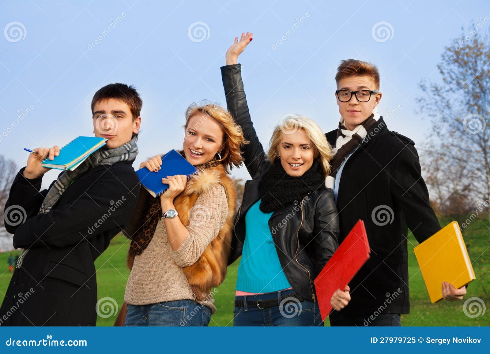 Four Students with Books Cheering Stock Image - Image of happiness ...