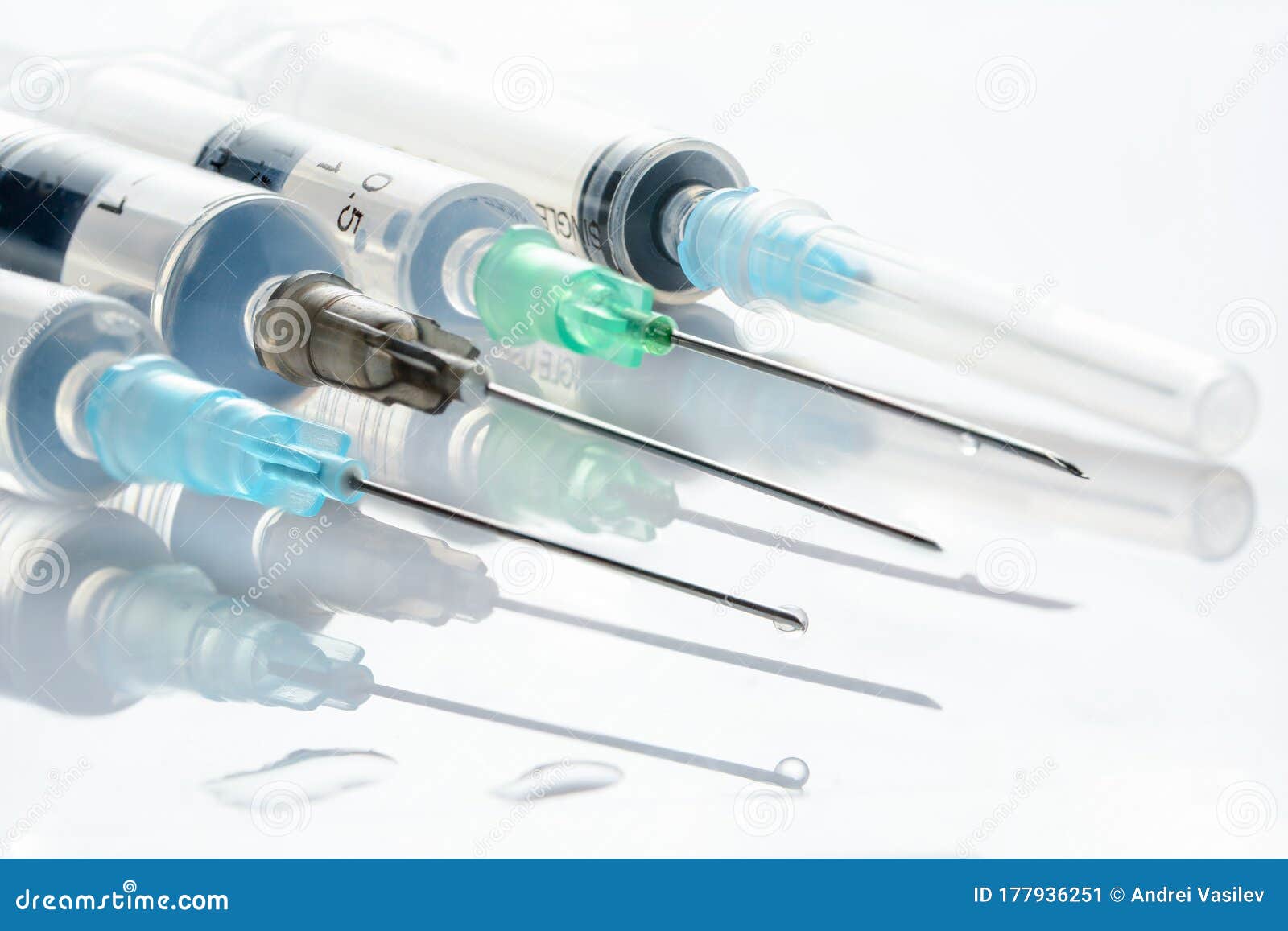 Four Syringes with Medicinal Solution, on White Background with ...
